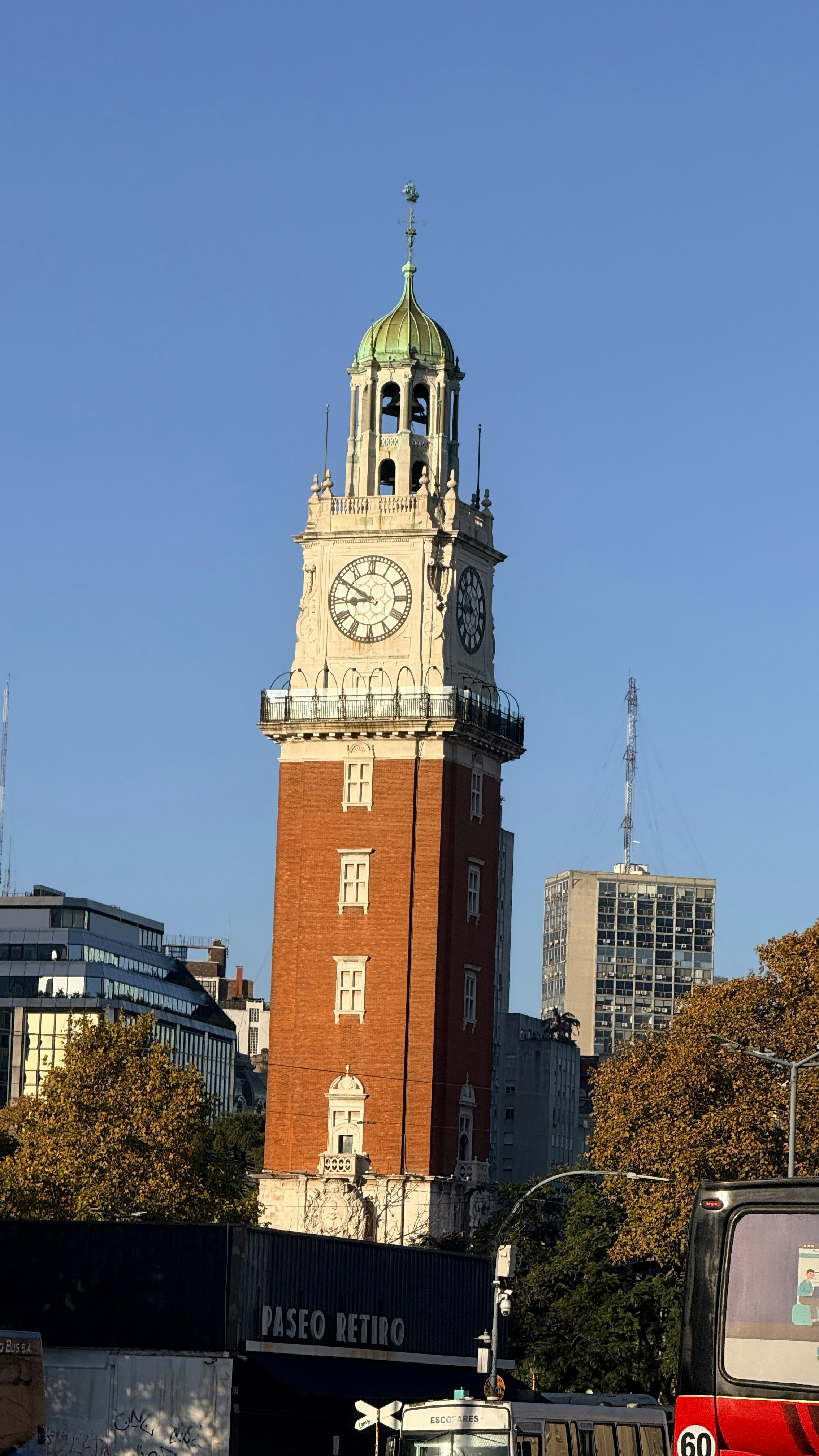 Clock Tower Rising Over the City: A Sunlit Skyline