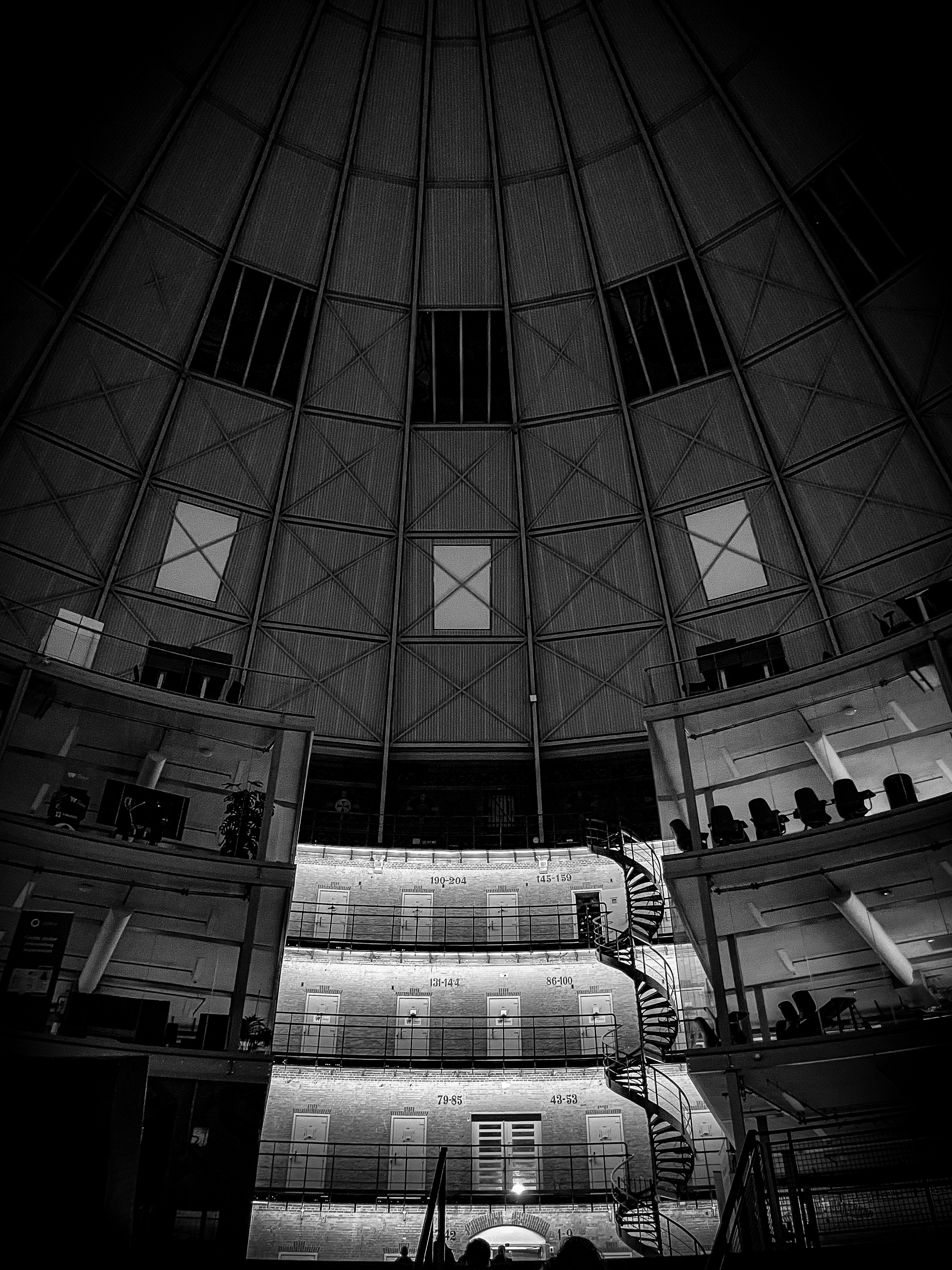 Architectural Atrium: Spiral Staircase Centered Under a Glass Dome