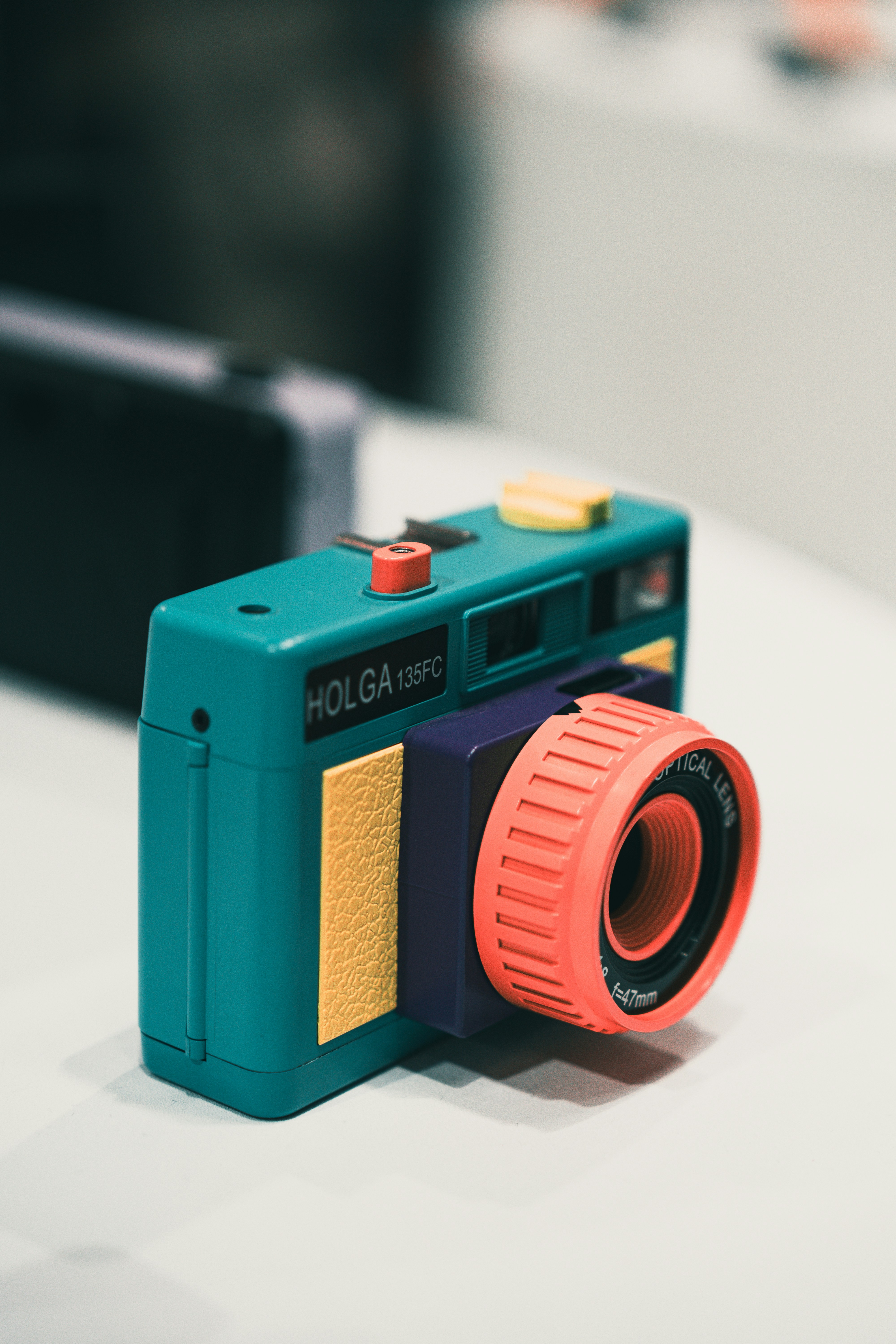 Colorful Retro Camera Toy Staring Down the Lens