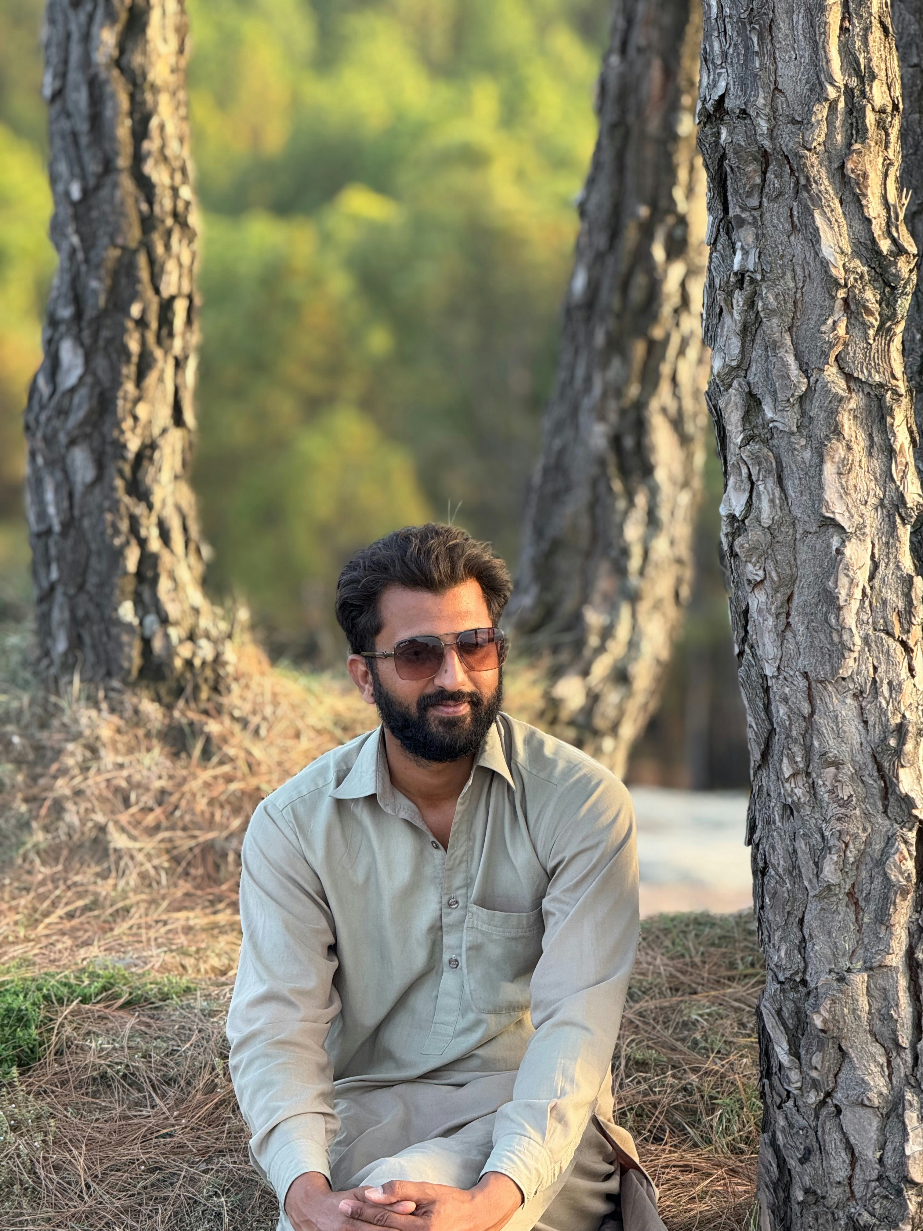 Serene Forest Portrait: A Man in the Shade