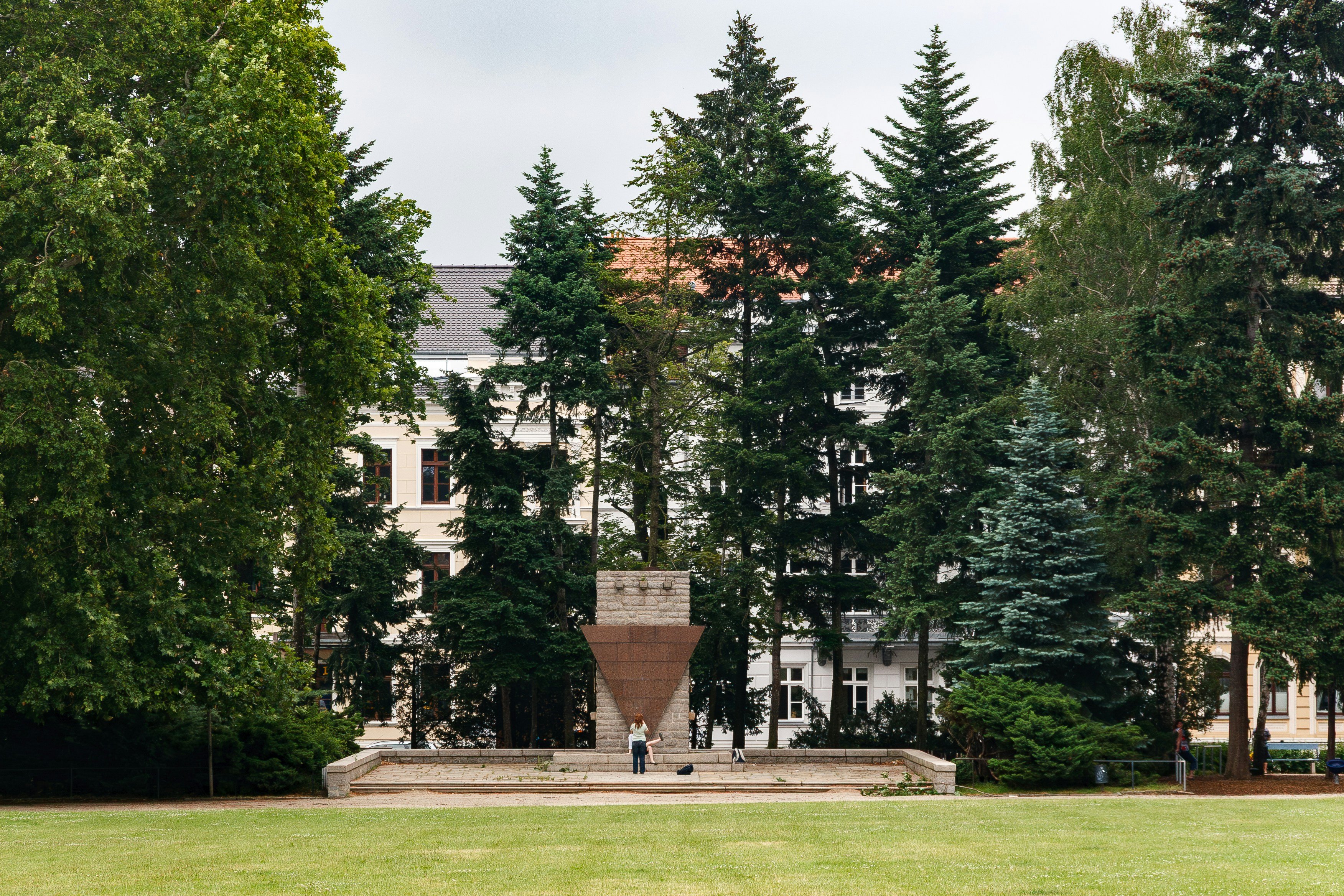 Monumental Stairway Framed by Pines at an Academic Courtyard