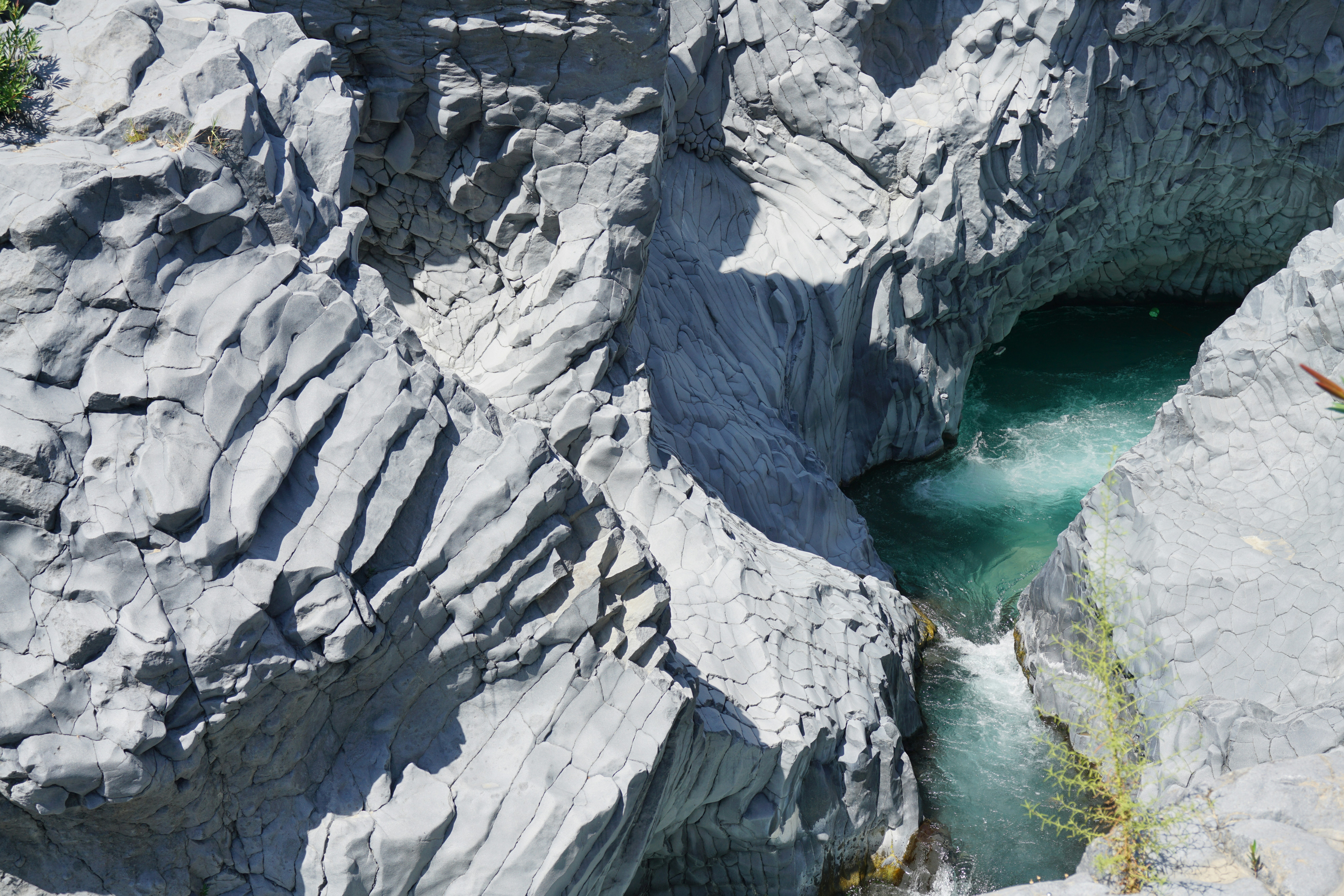 Rugged Marble Gorge: A Turquoise Vein Carved Through White Cliffs