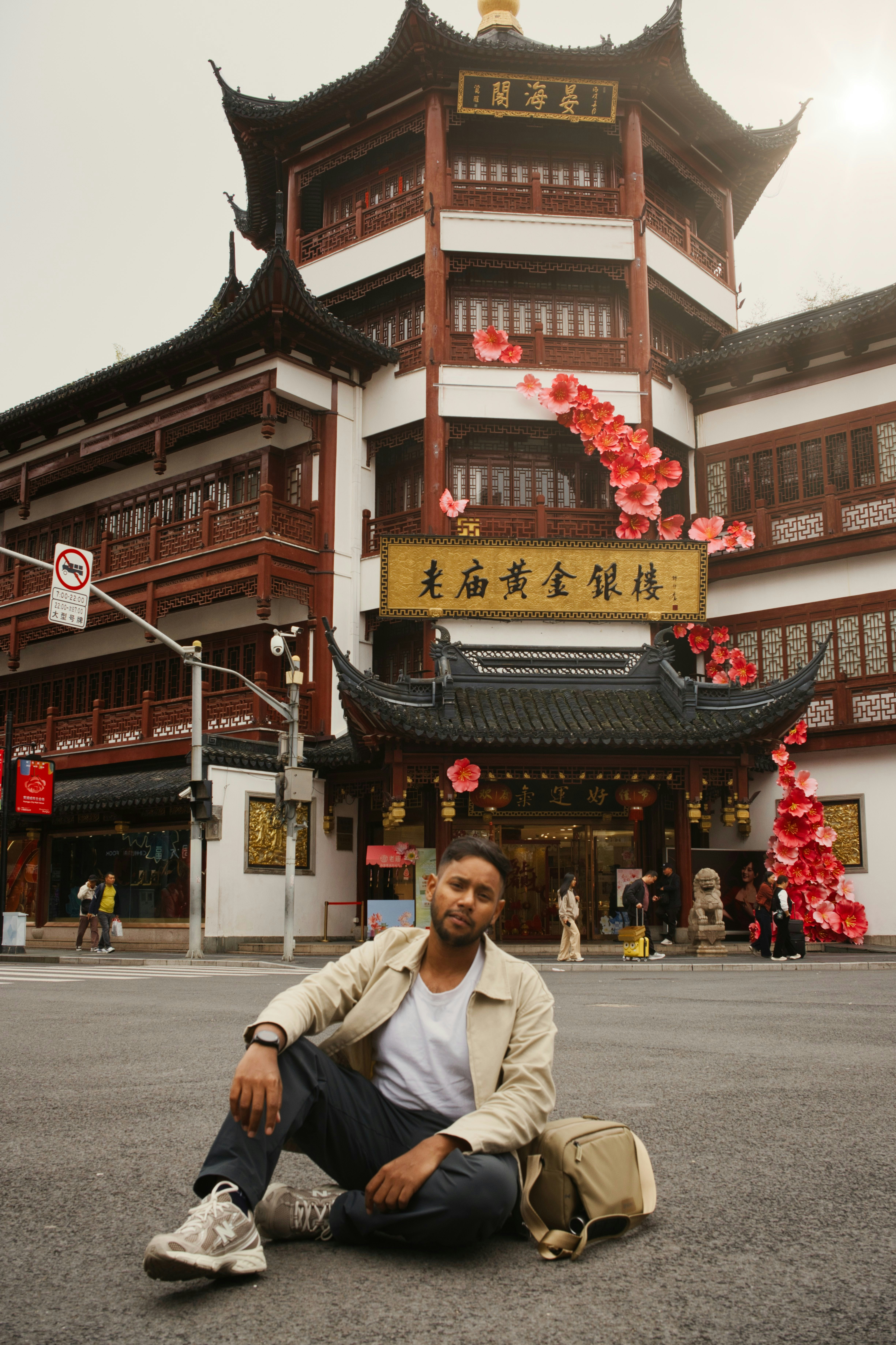 Traveler at the Gate: Quiet Moment Before the Pagoda