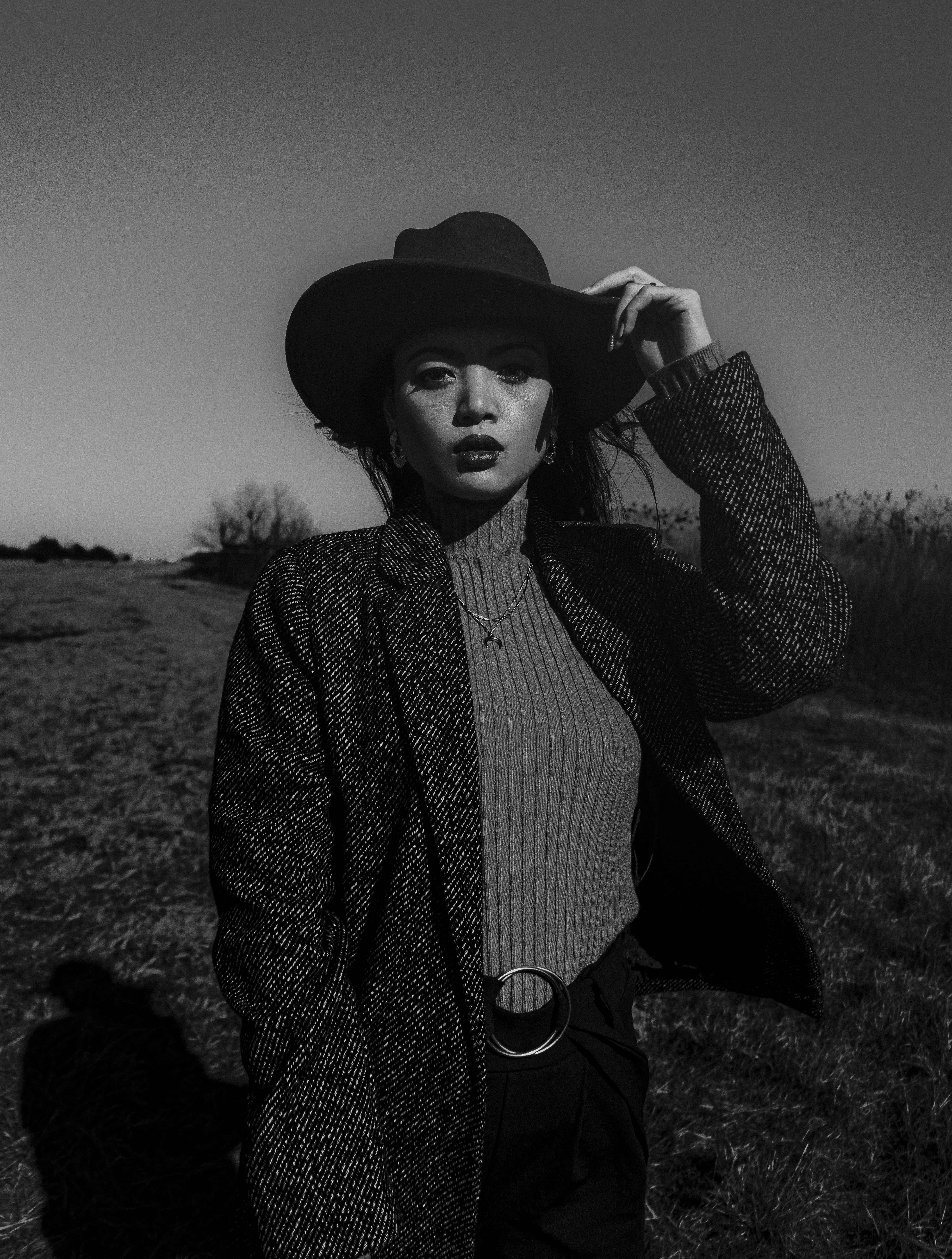 Shadowed Elegance: A Portrait in Monochrome There and Here