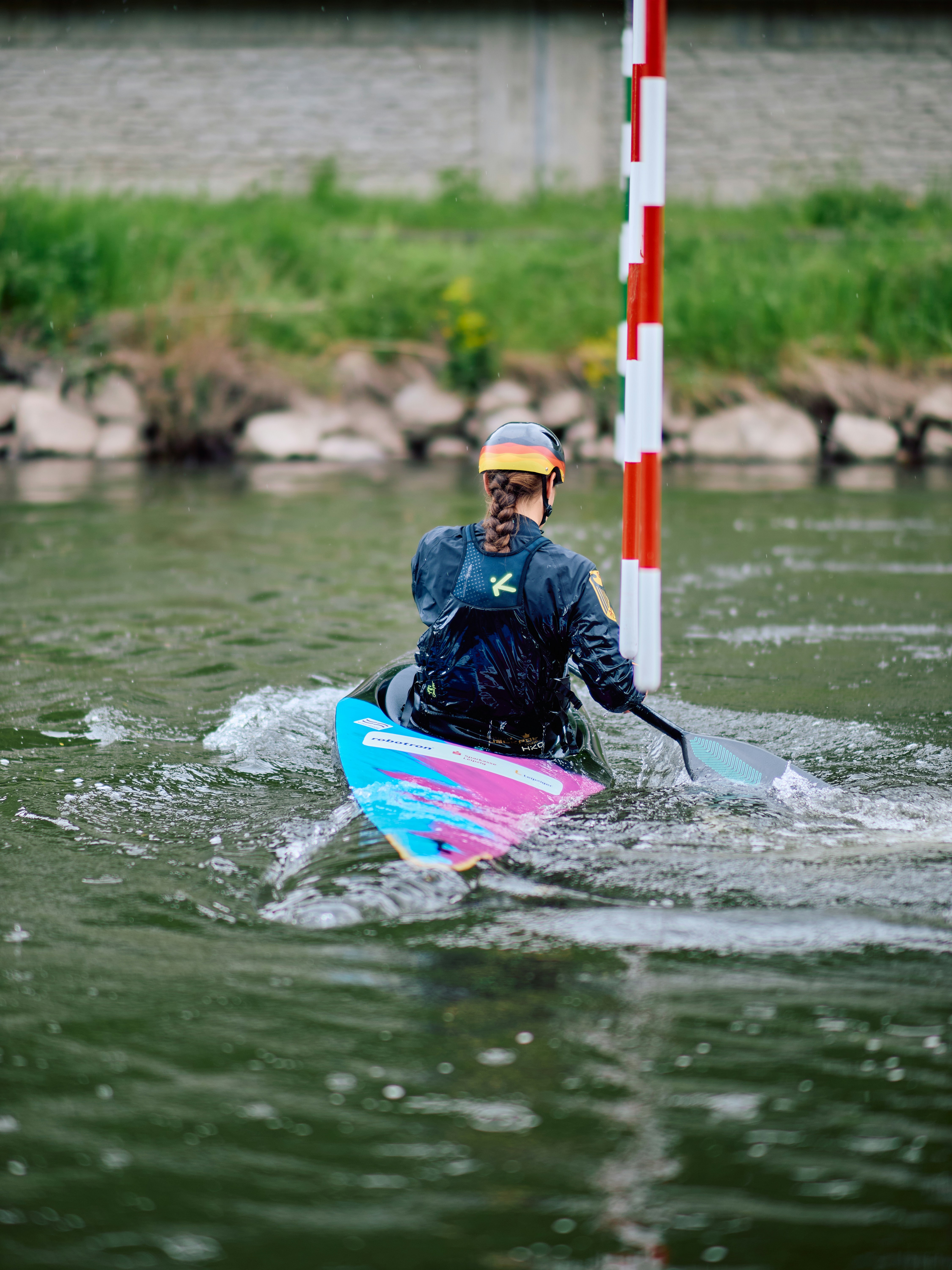 Racing the Current: Cyclist Navigates a Water-Obstacle Gate