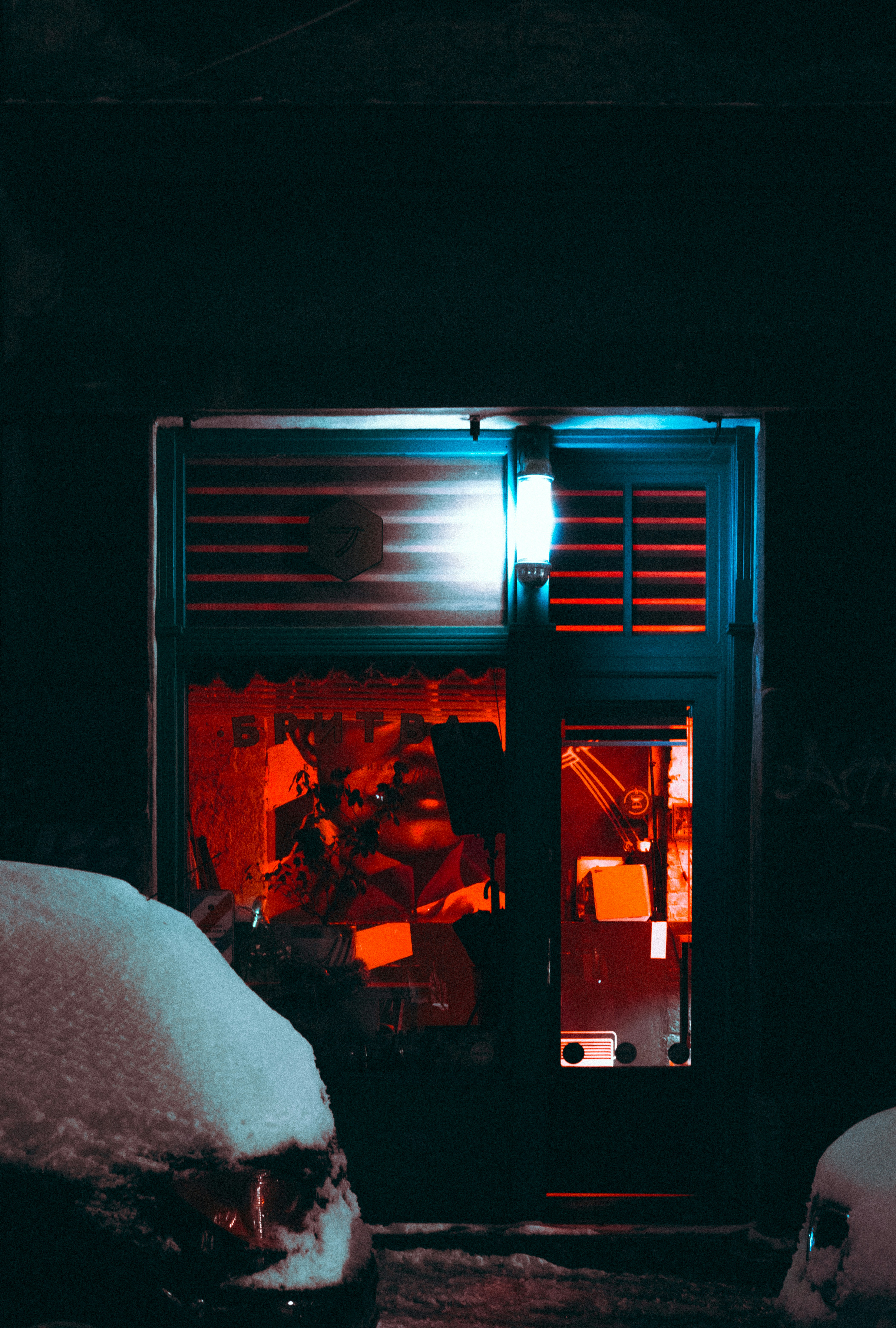 Neon-lit Doorway: Snowbound Street Echo