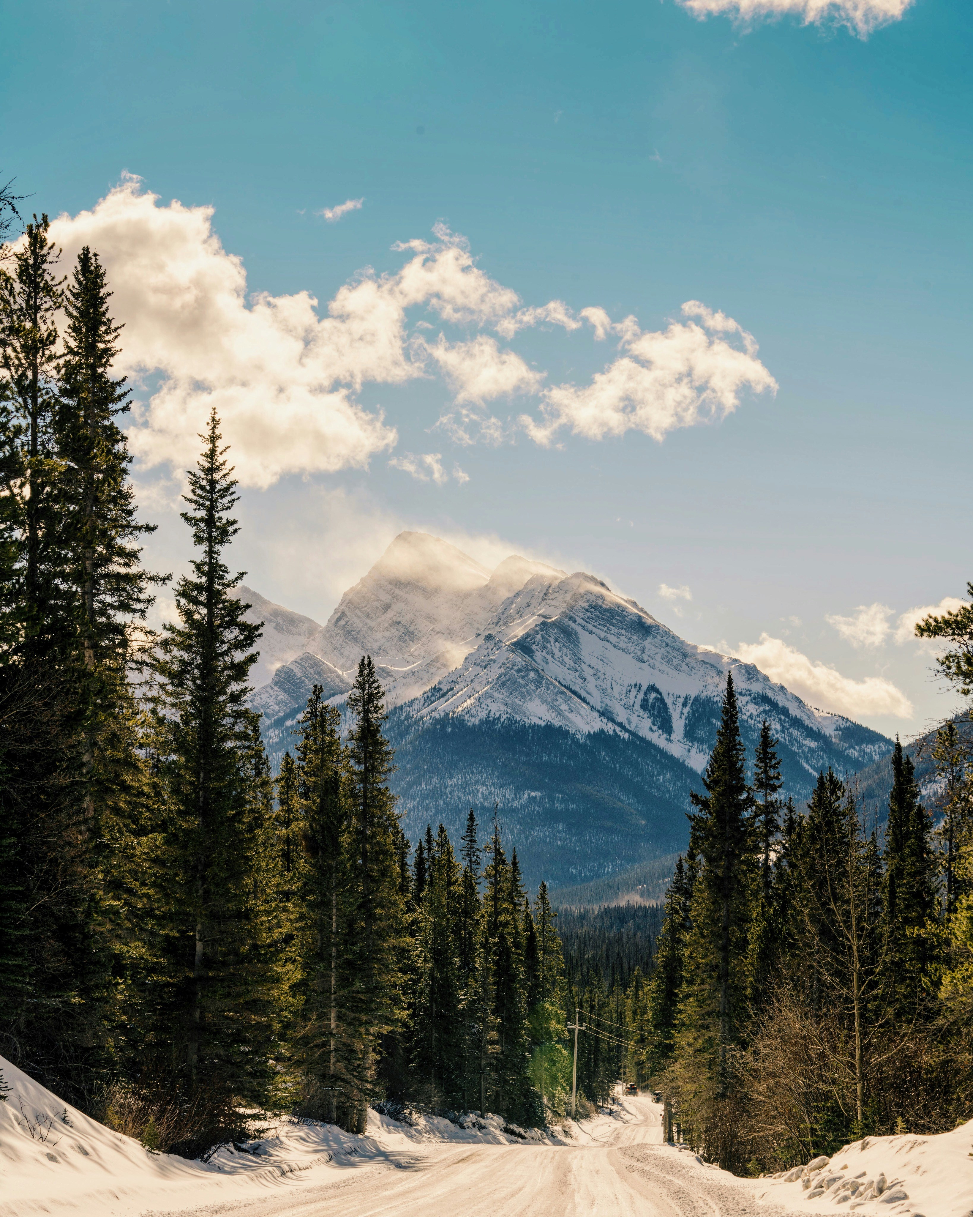 Snowbound Pathway Toward a Crowned Peak