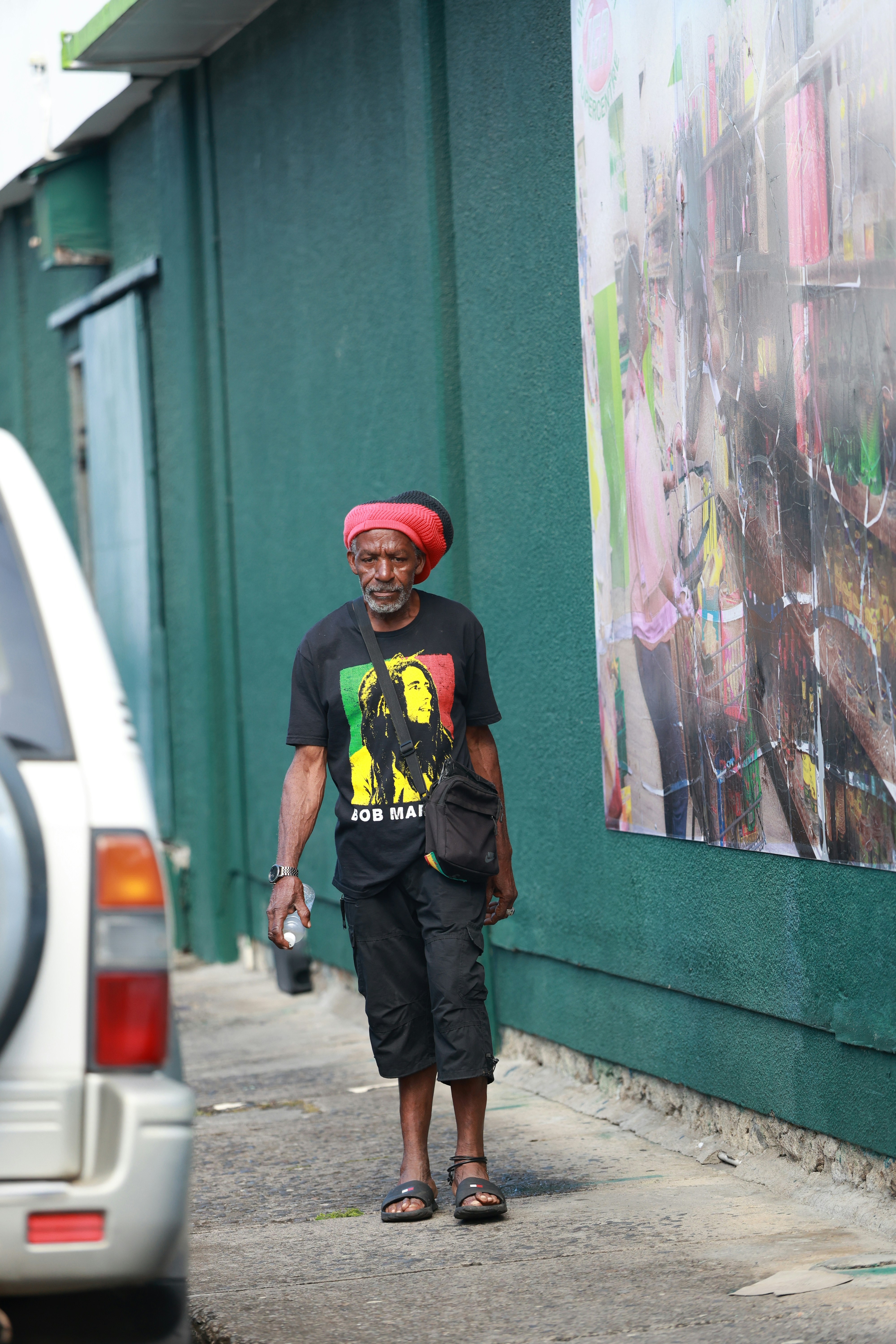 Rasta Traveler in Front of Colorful Wall