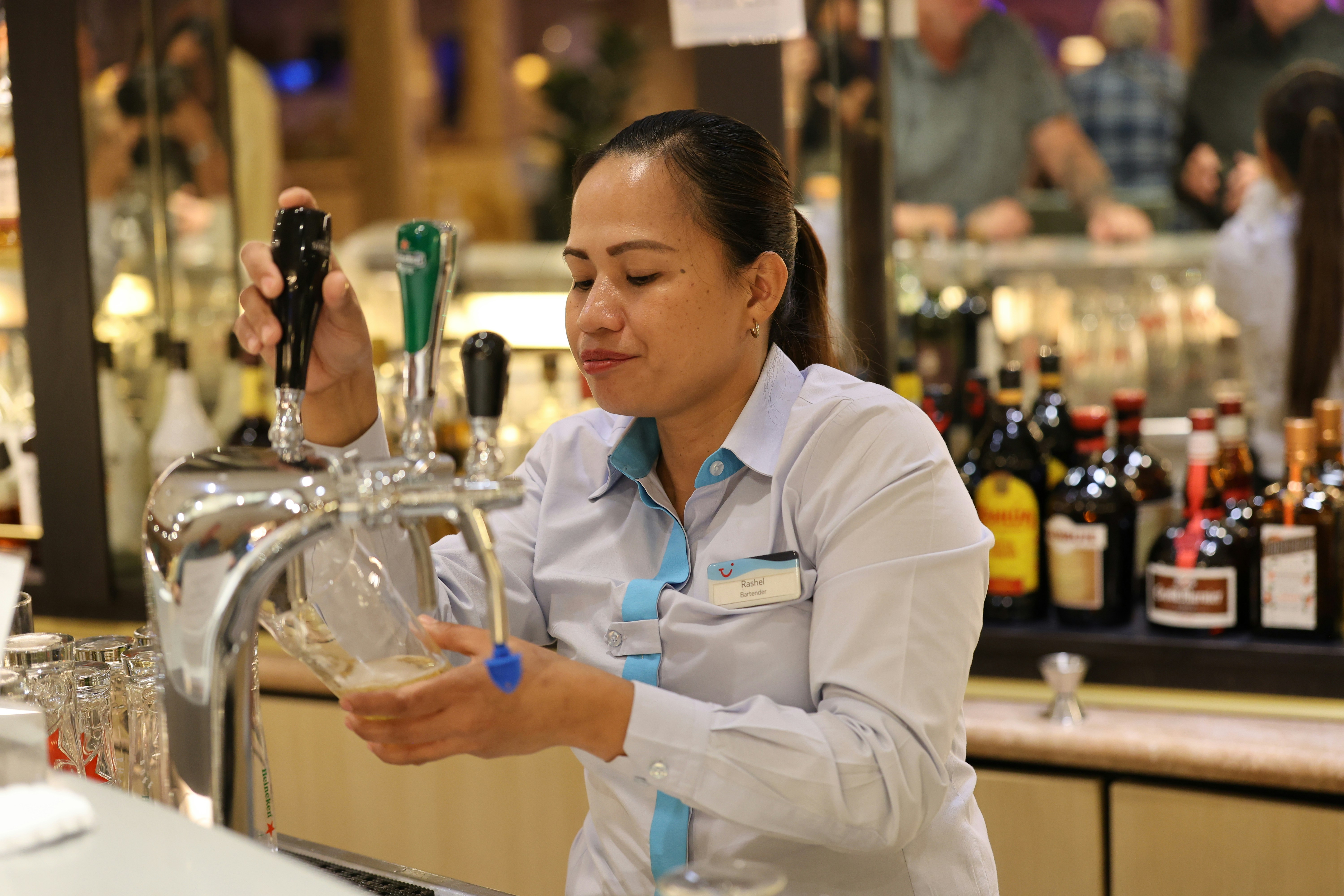 Bartender in focus: crafting precision with a bottle of clarity