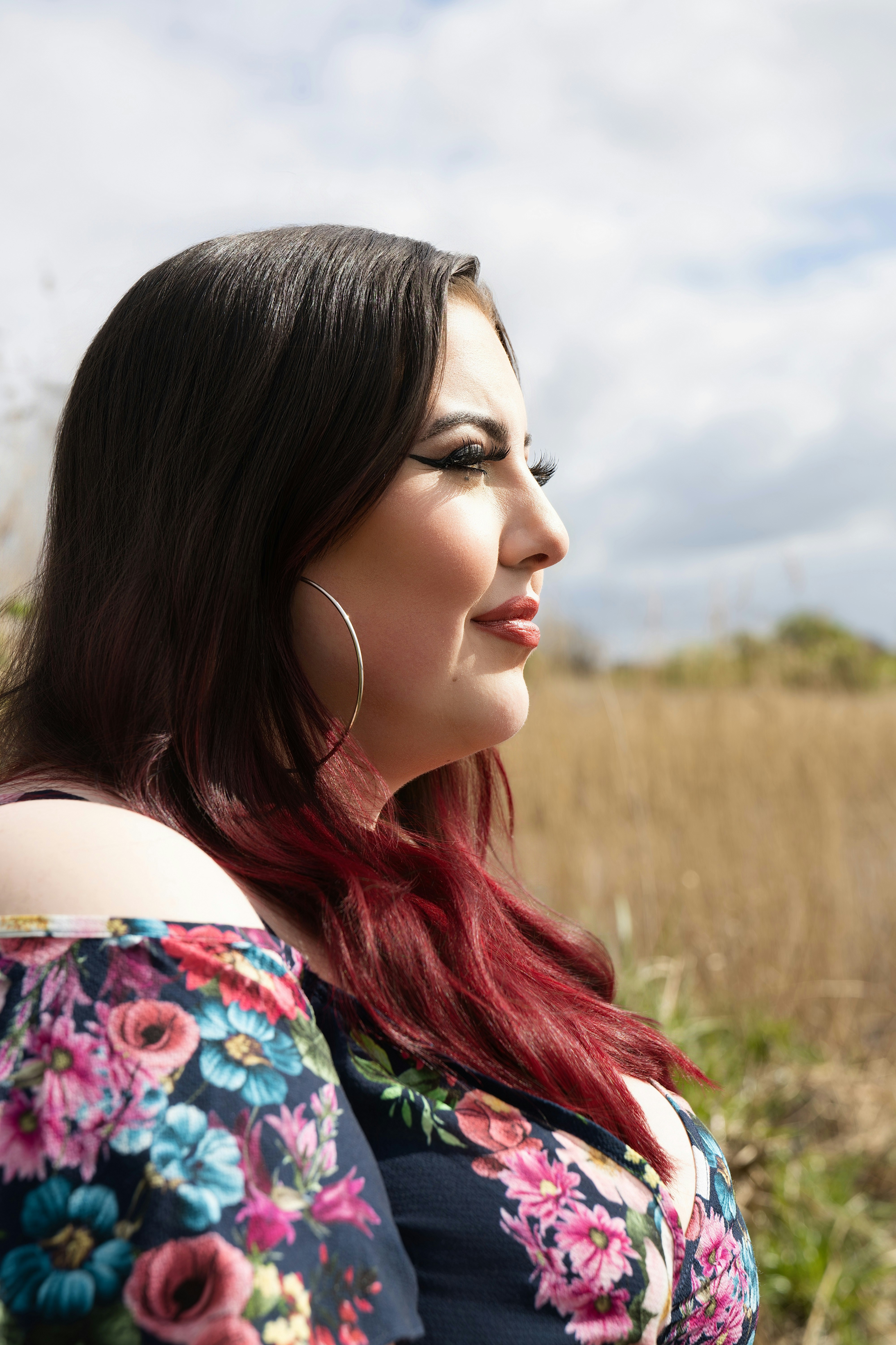 Sunlit Profile: A Floral-Print Moment in Open Field