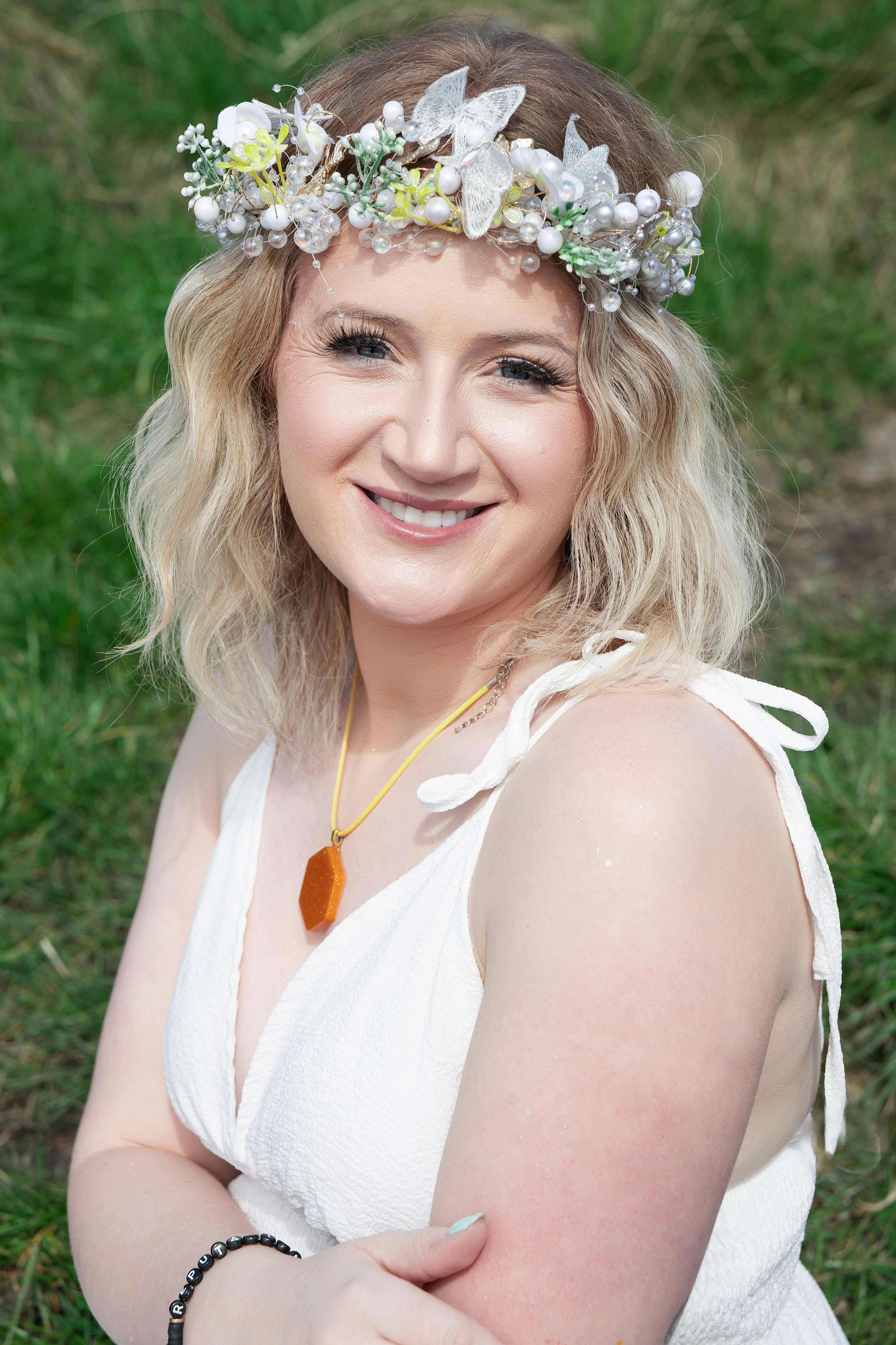 Floral Halo and Warm Smile in Sunlit Meadow