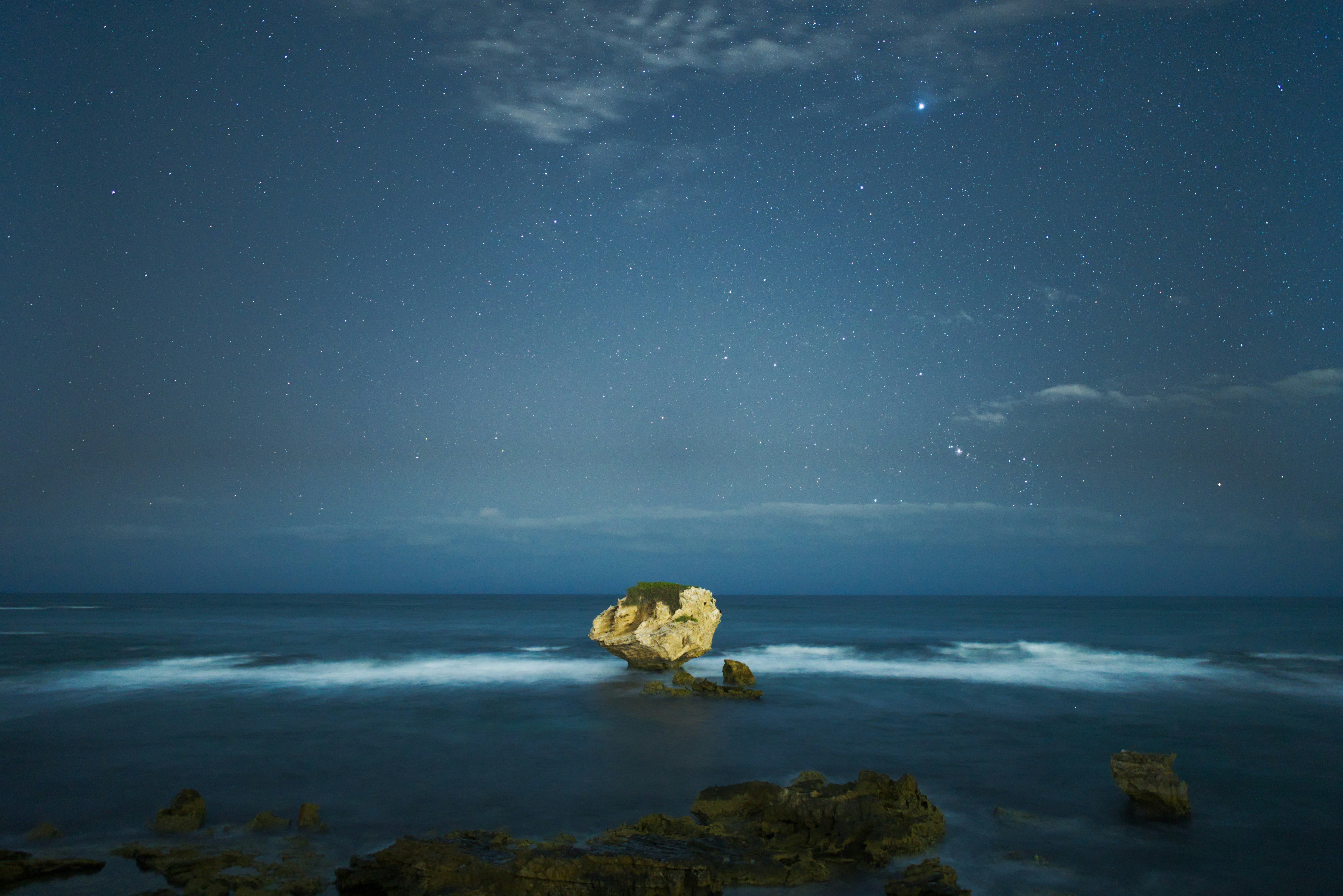 Lone Seastone Under a Starry Night