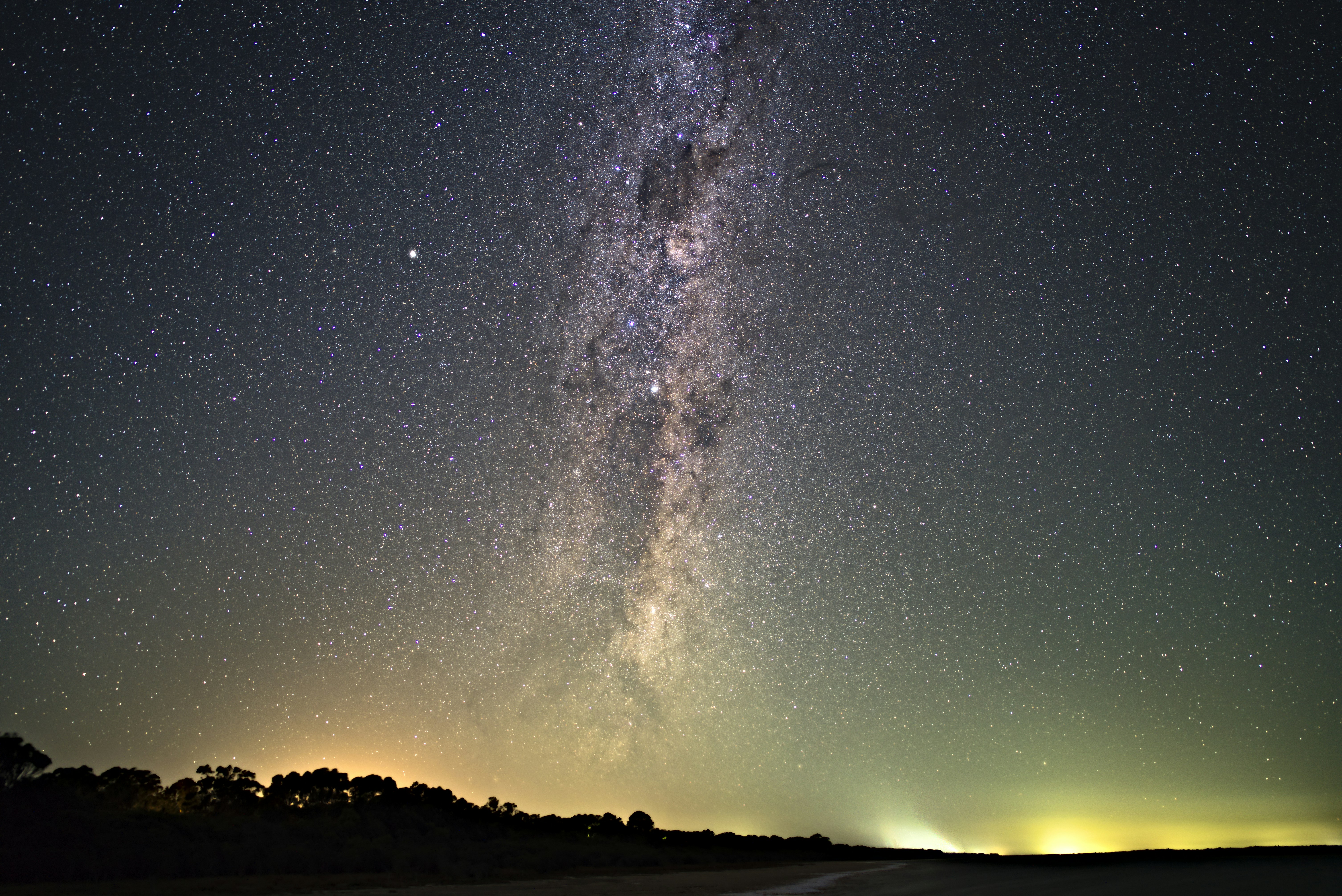 Milky Way Arch Over a Quiet Horizon