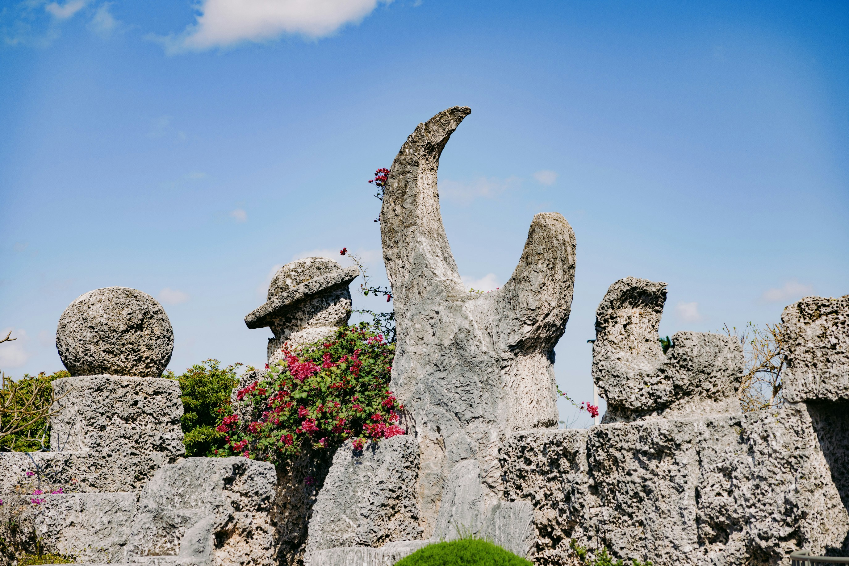 Stone Whispers: Ancient Figures and Sky