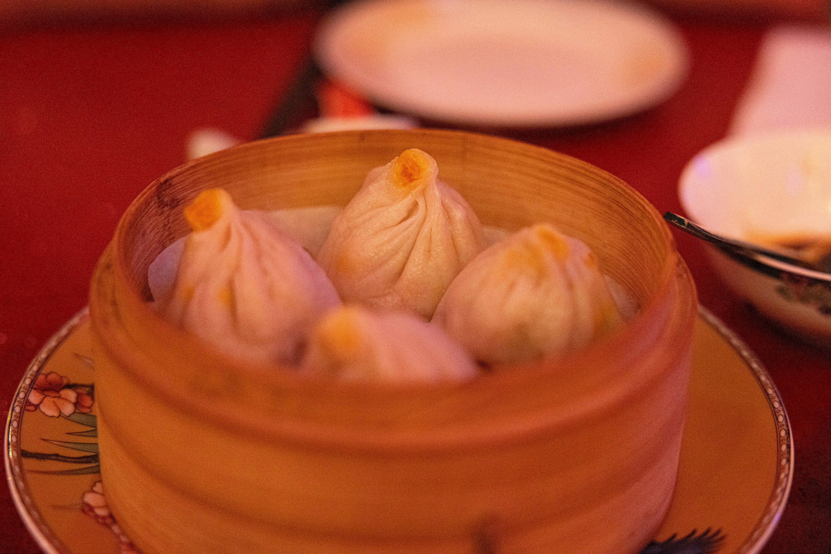 Dim Sum Steam: Soft Dumplings Resting in a Bamboo Basket