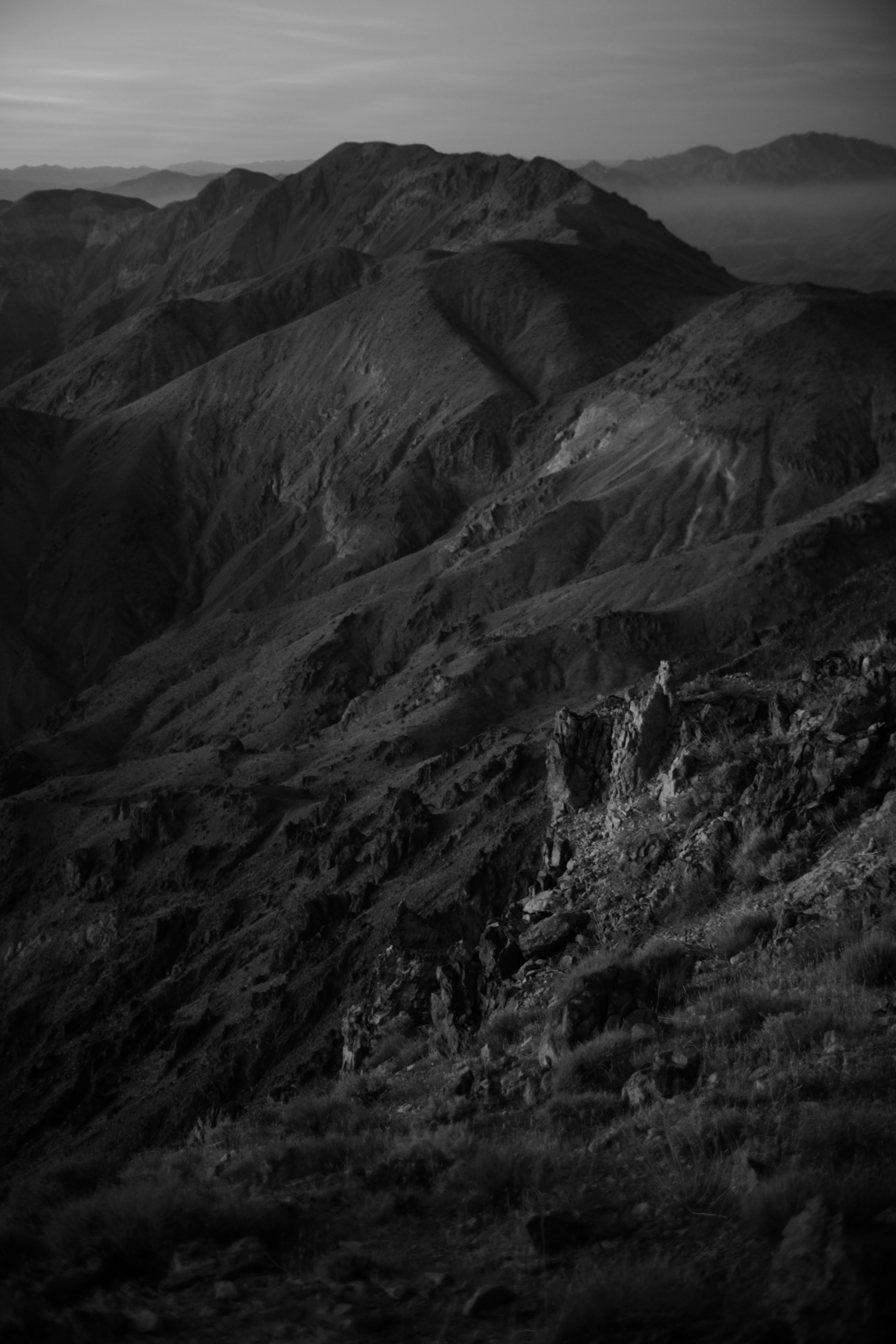 Ridge and Shadow: A Quiet Descent Through Granite Waves