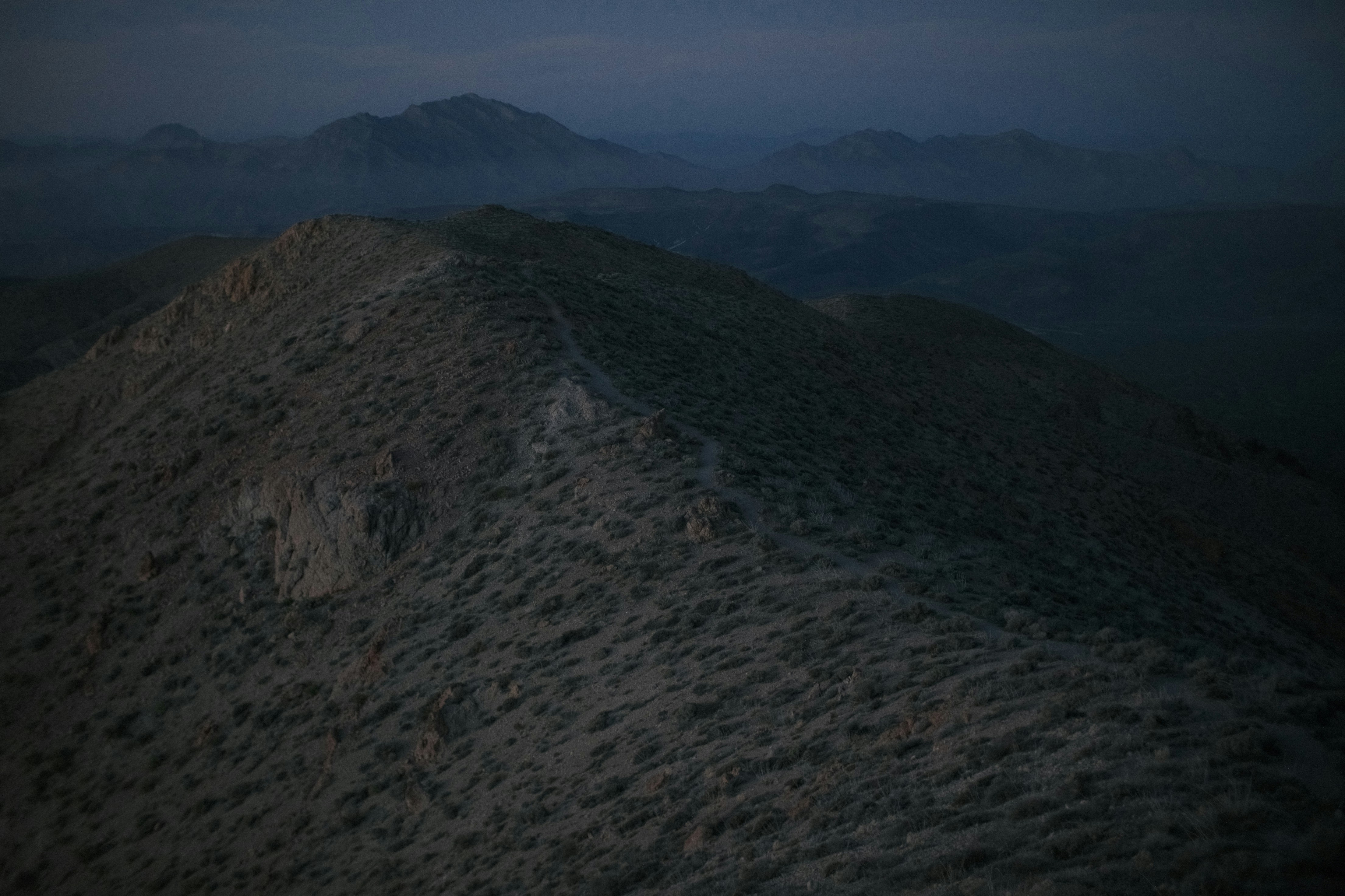 Dusk on the Ridge: Quiet Veil Over Range