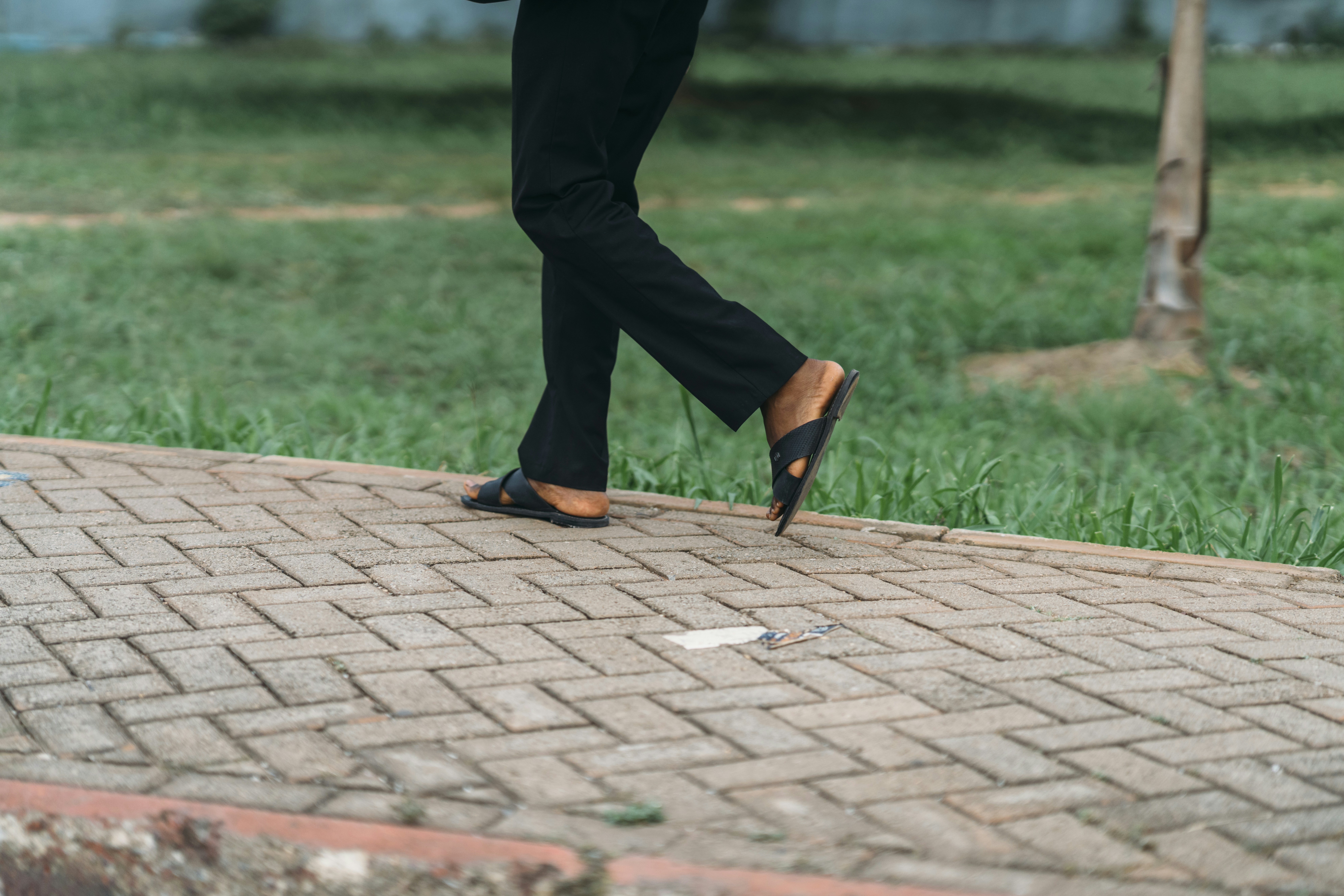Stride in Shadow: A Solo Step on the Brick Path
