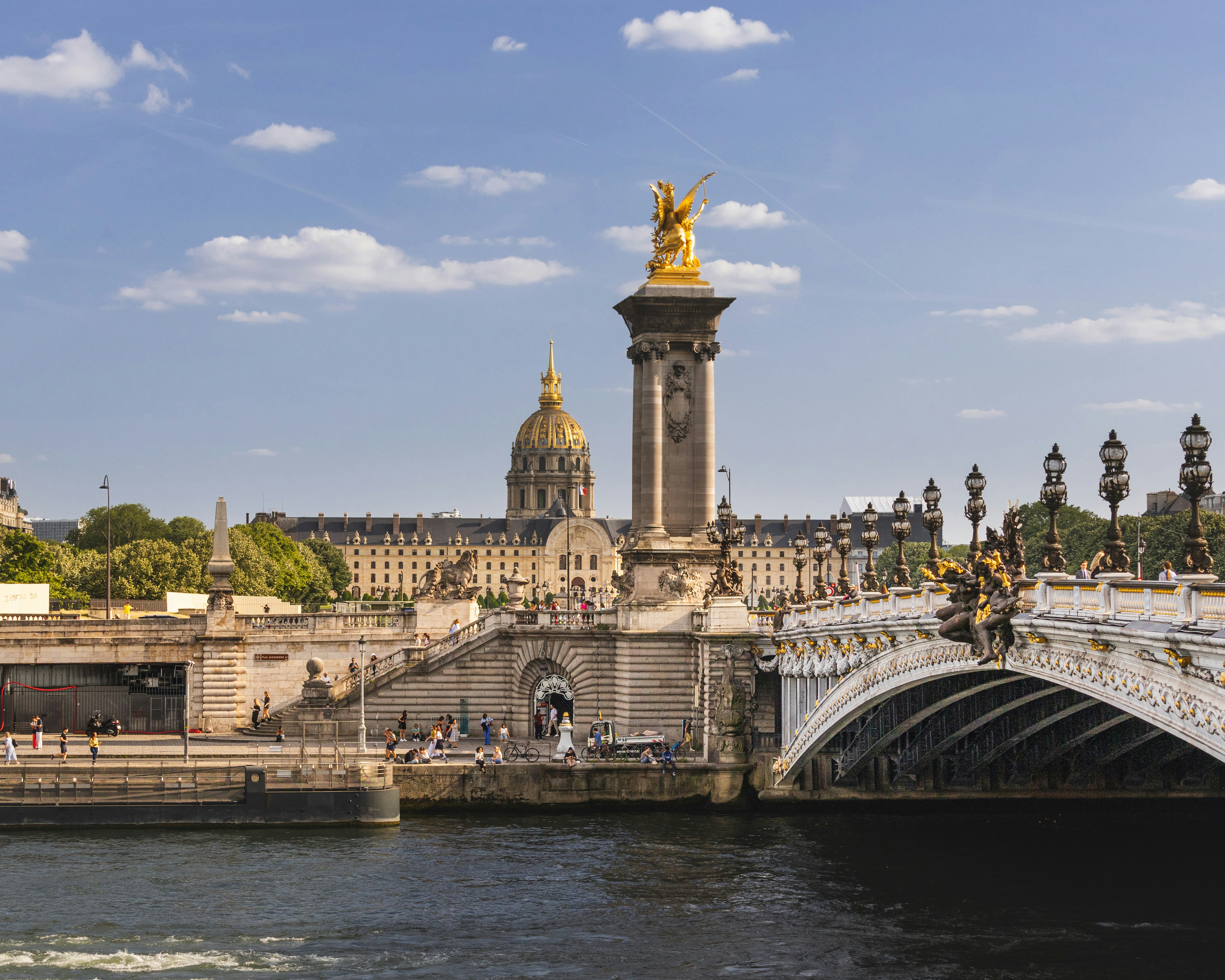 Golden Statue, Stone Gateways, and River Reflections on the Pont Alexandre III