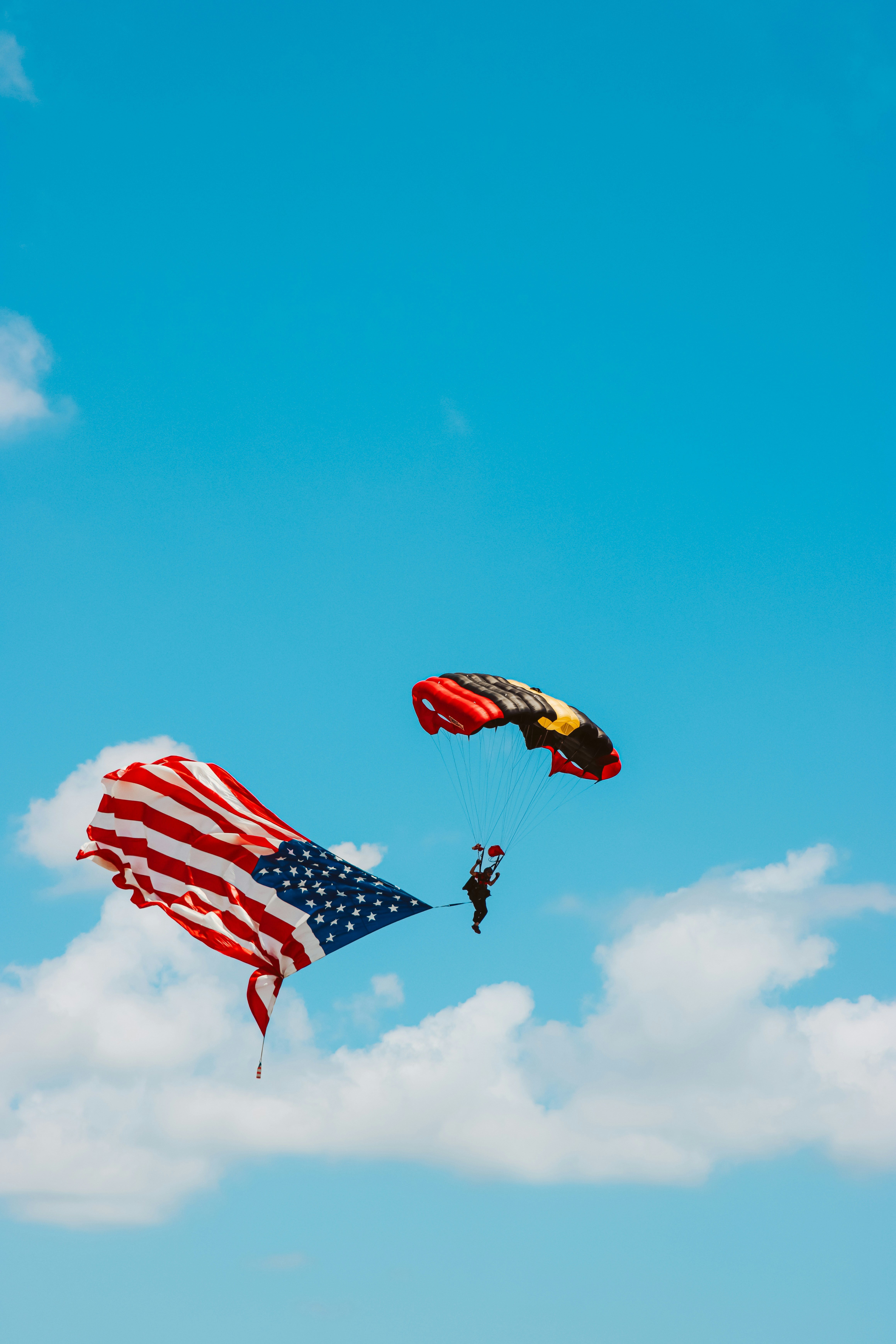Parachuter flying the American flag