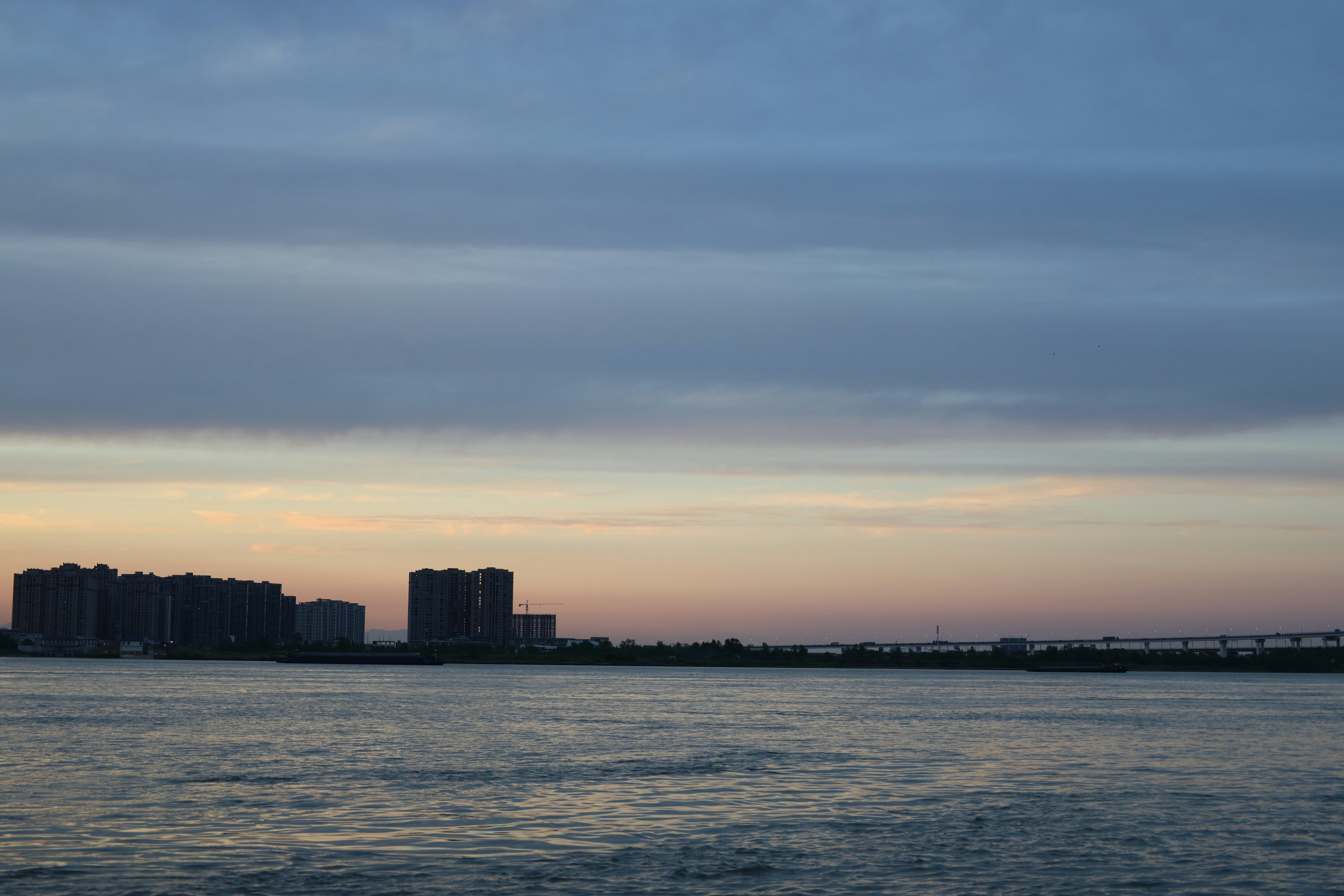 Dusk Over the Riverside Edge