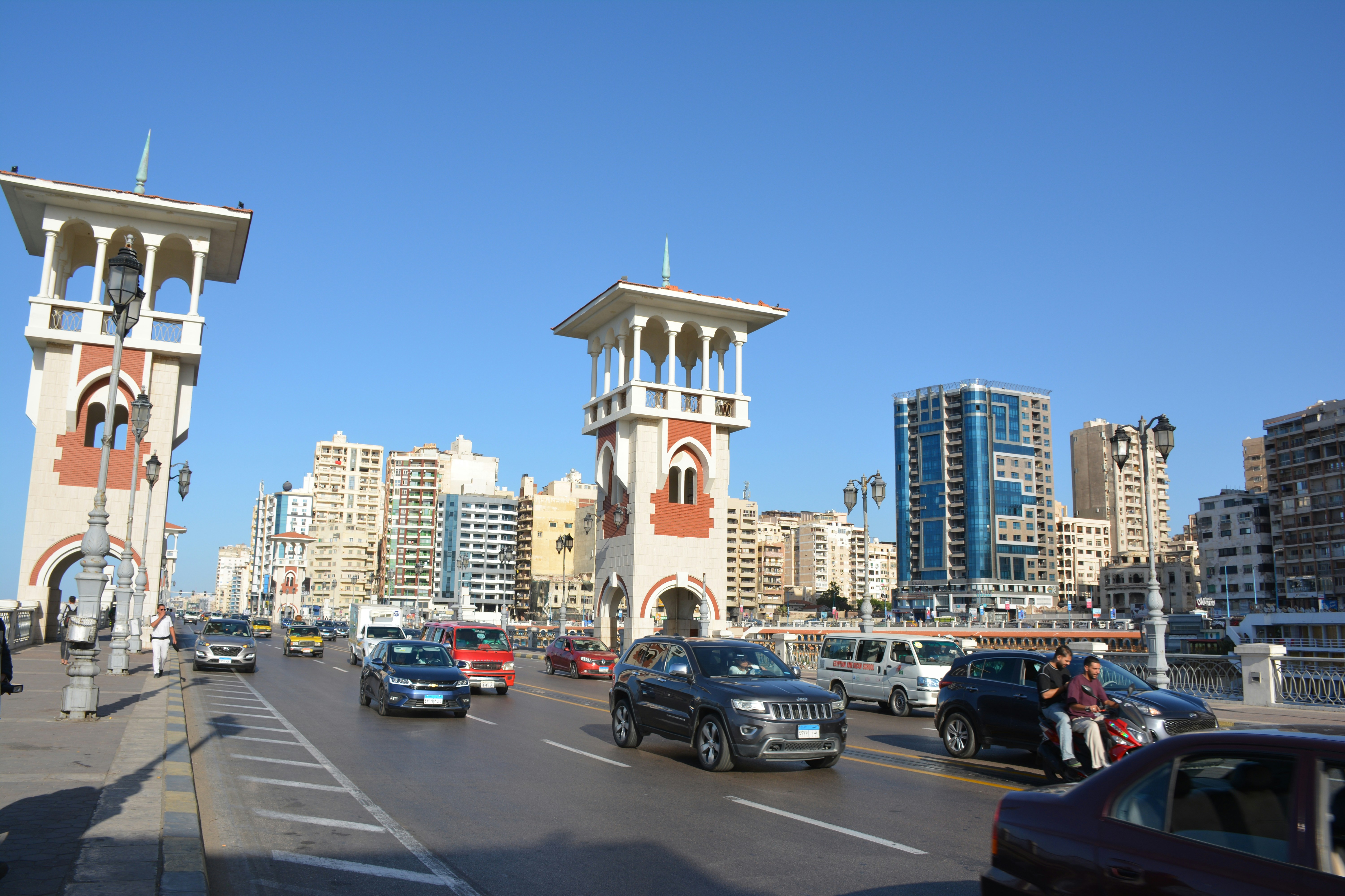 City Gate Towers Framing a Busy Seafront Boulevard