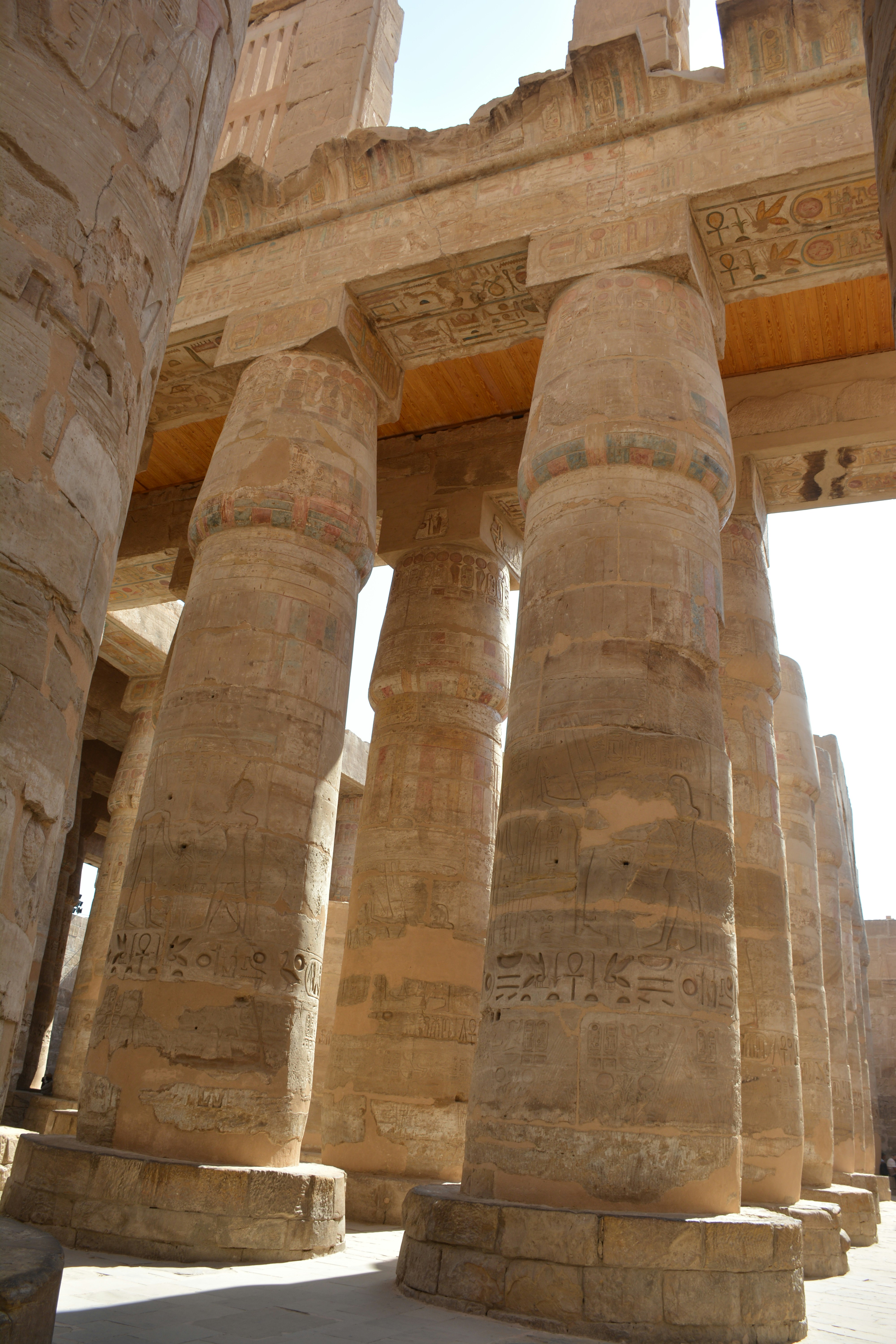 Columns of Time: Ancient Pillars Rise in Sunlit Temple