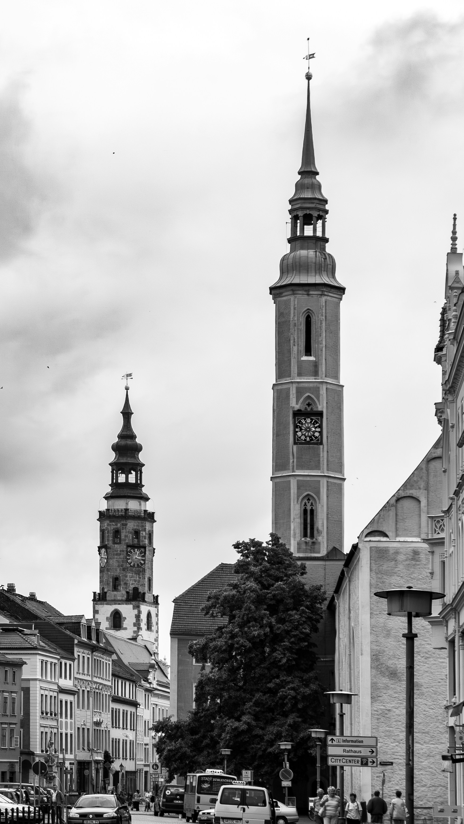 Timeless Spire: A Street Portrait Meets City Silence