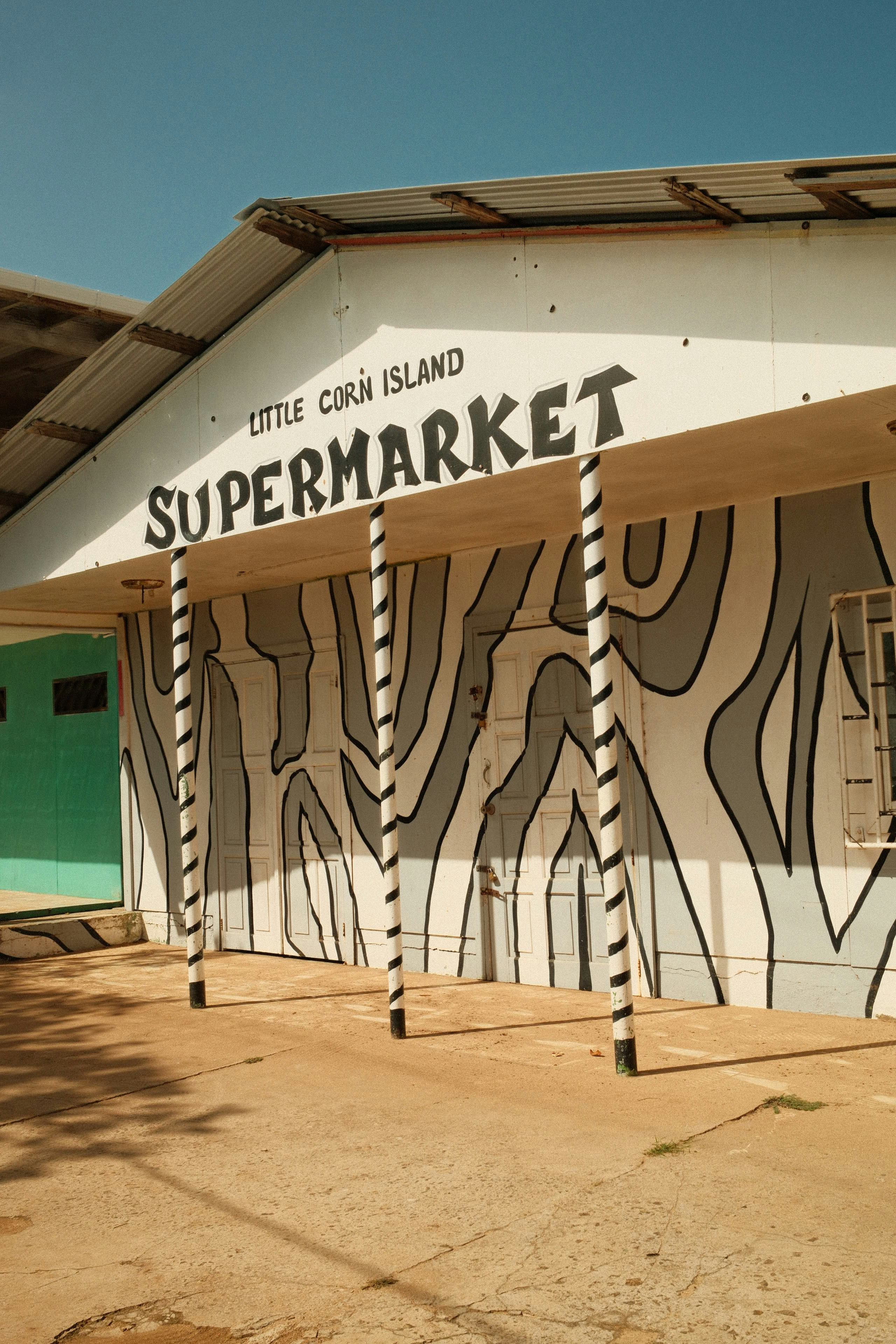 Striped Poles at a Coral Island Market