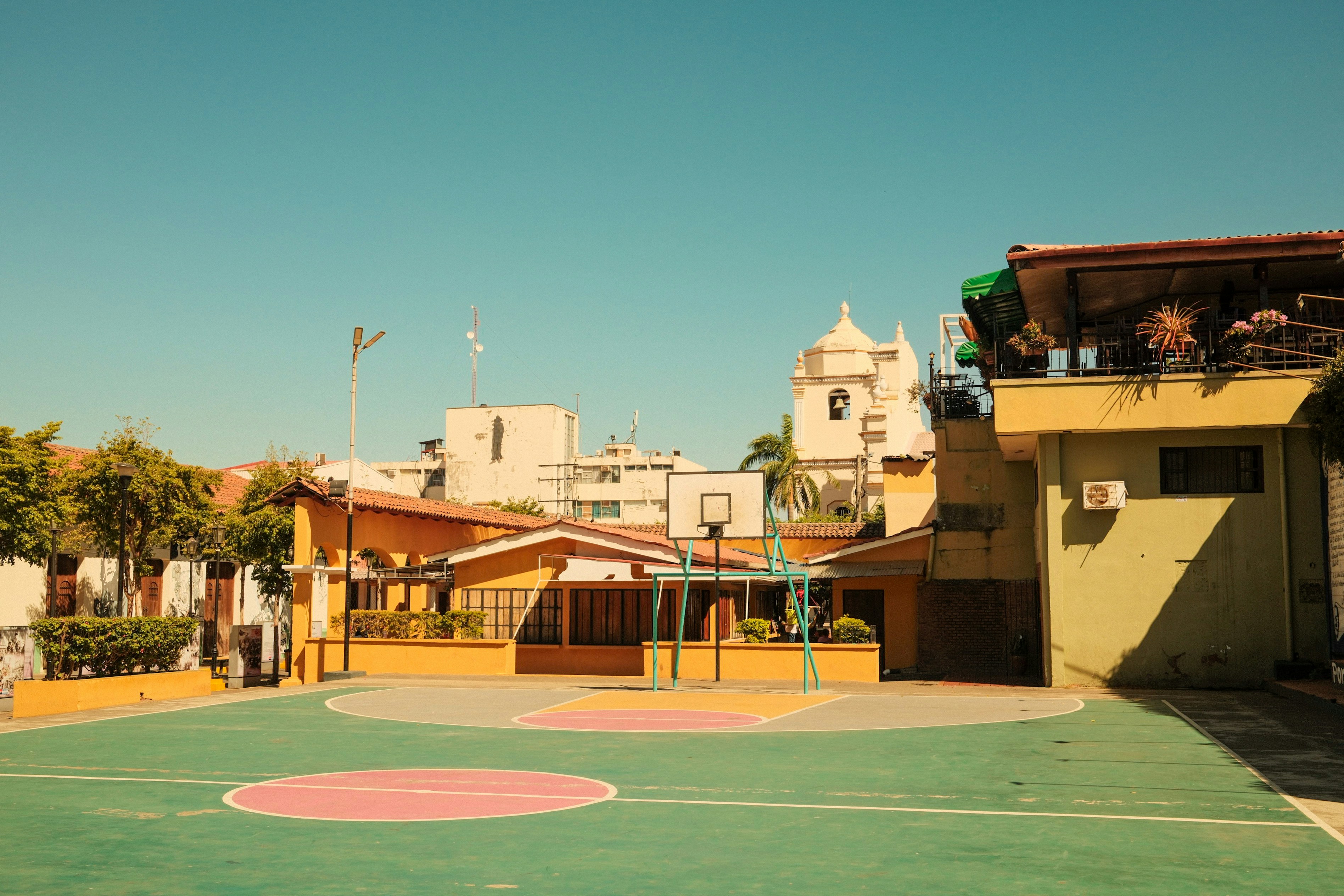 Sunlit Playground at the Edge of a Quiet Town