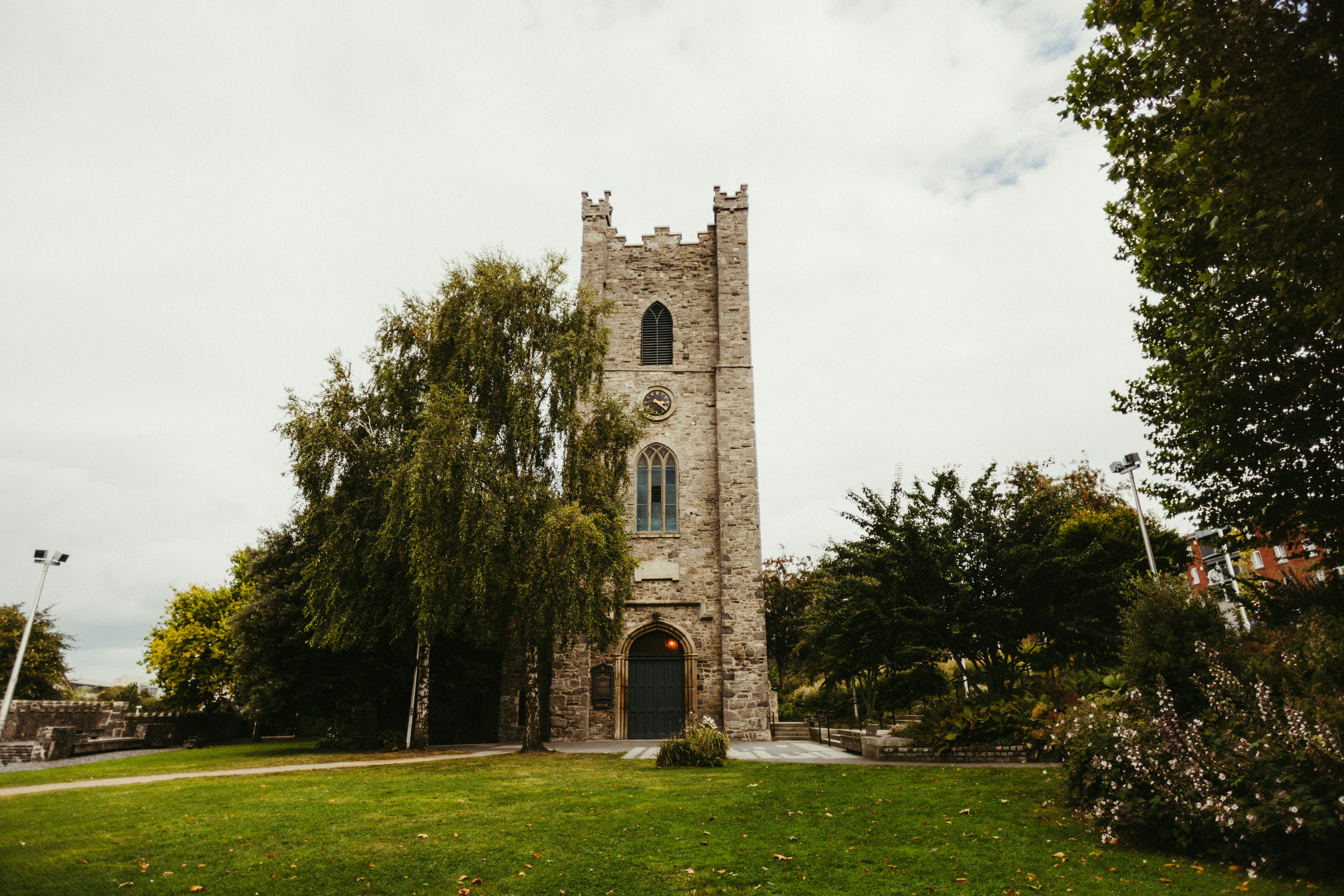 Stone Tower Gateway Rising Over the Park