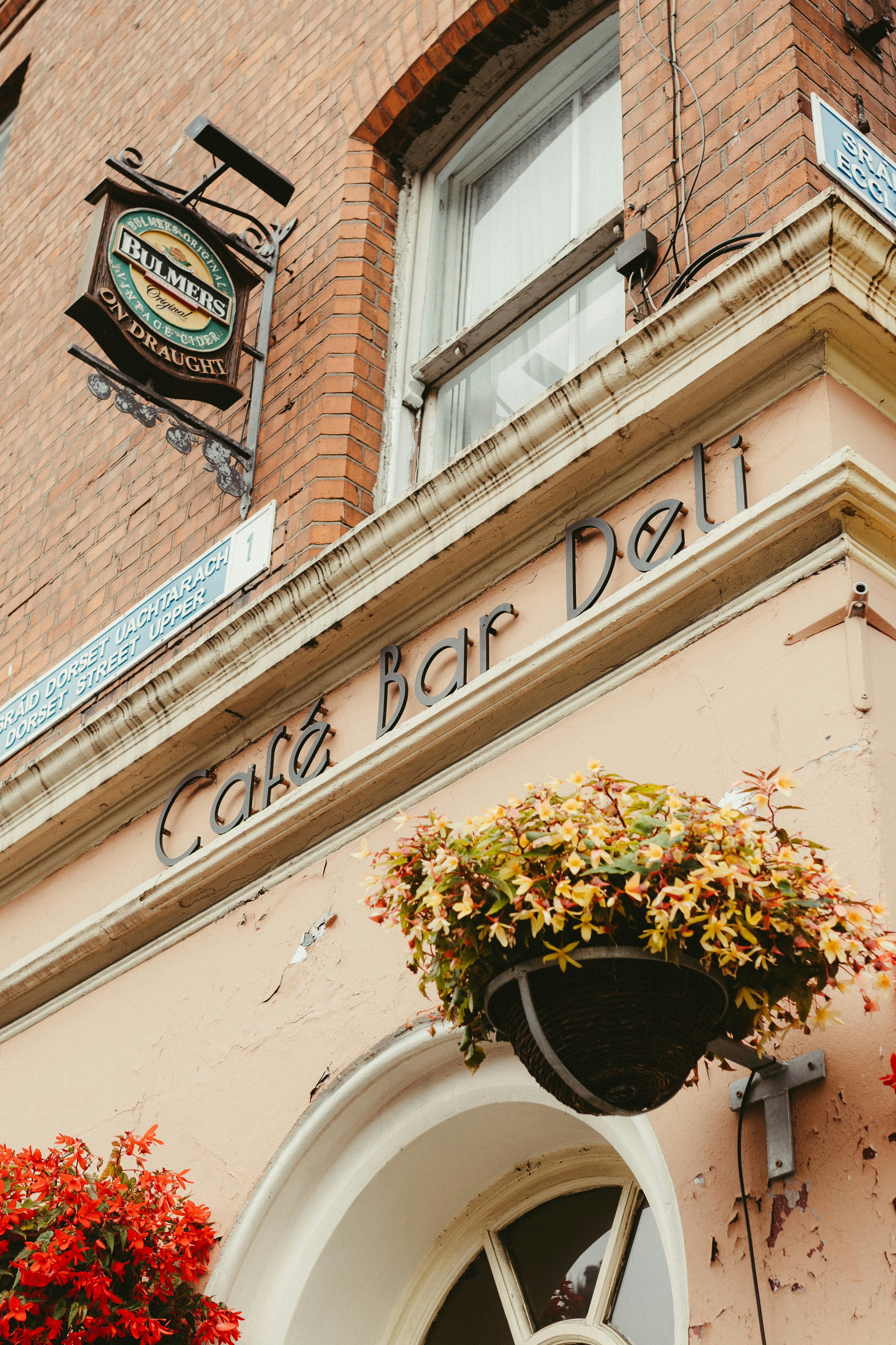 Cozy Corner Pub: Autumn Blooms by the Café Door