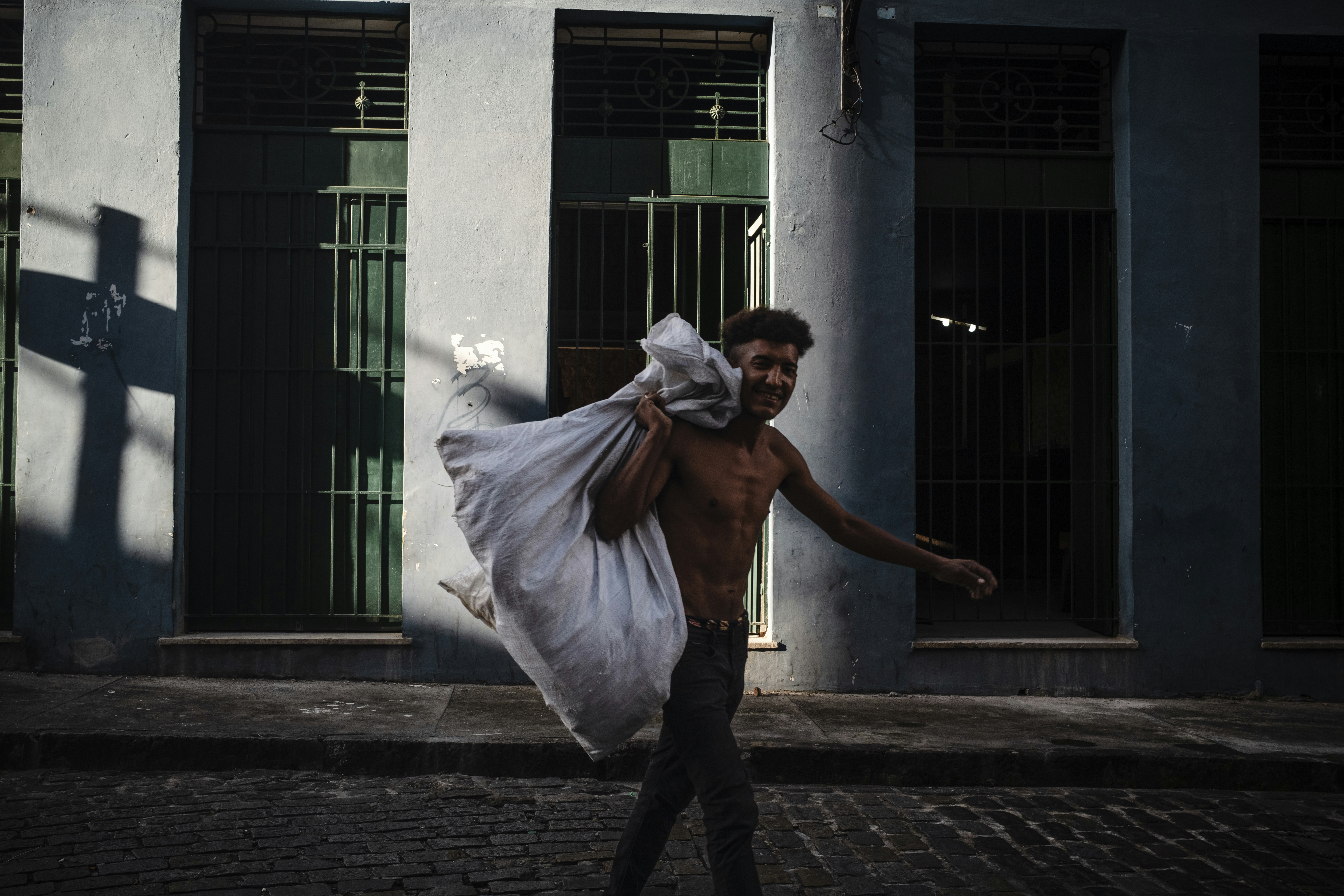 Lone Messenger in the Narrow Street