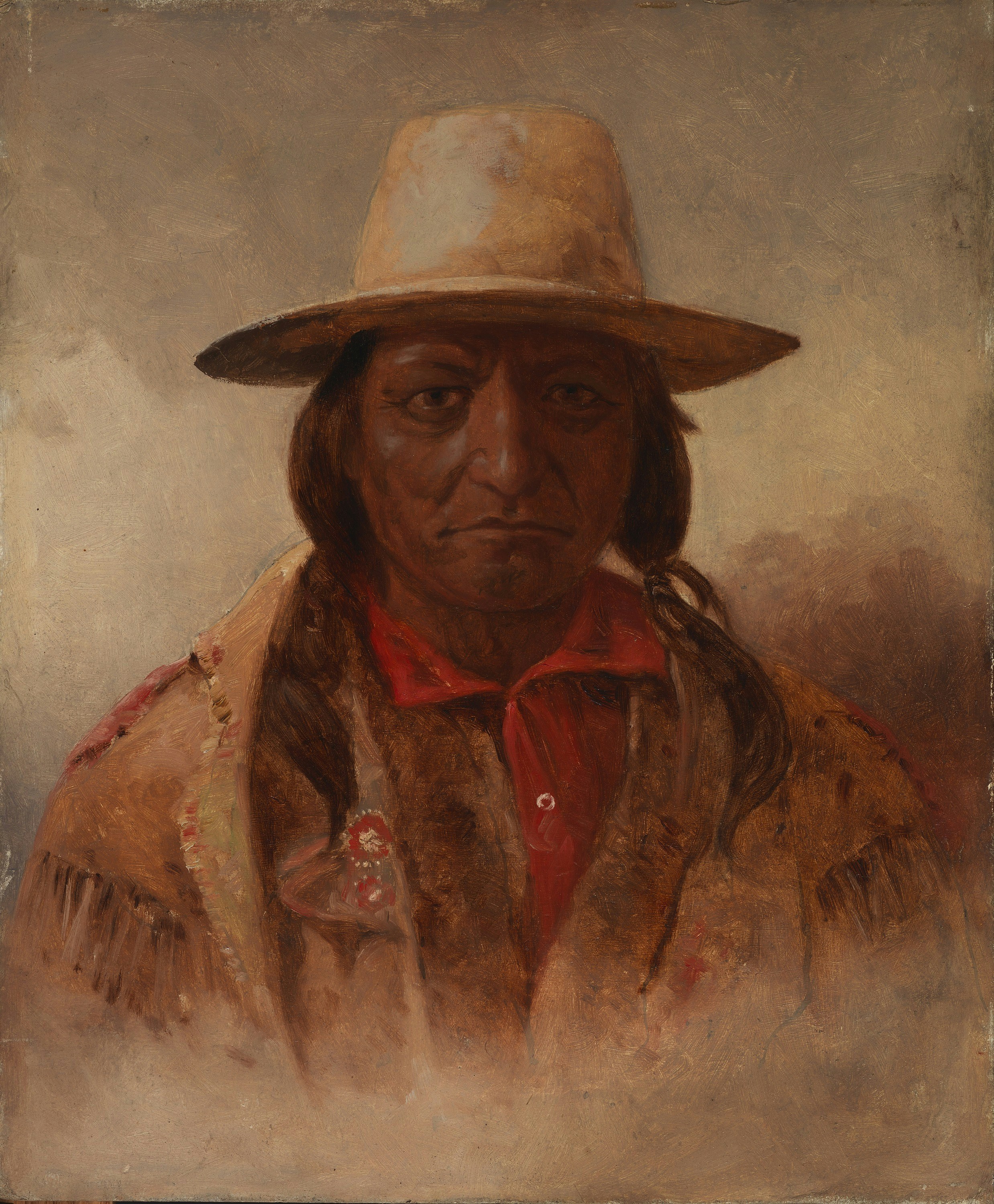 Portrait in Warm Hues: A Stoic Indigenous Man in a Wide-Brimmed Hat