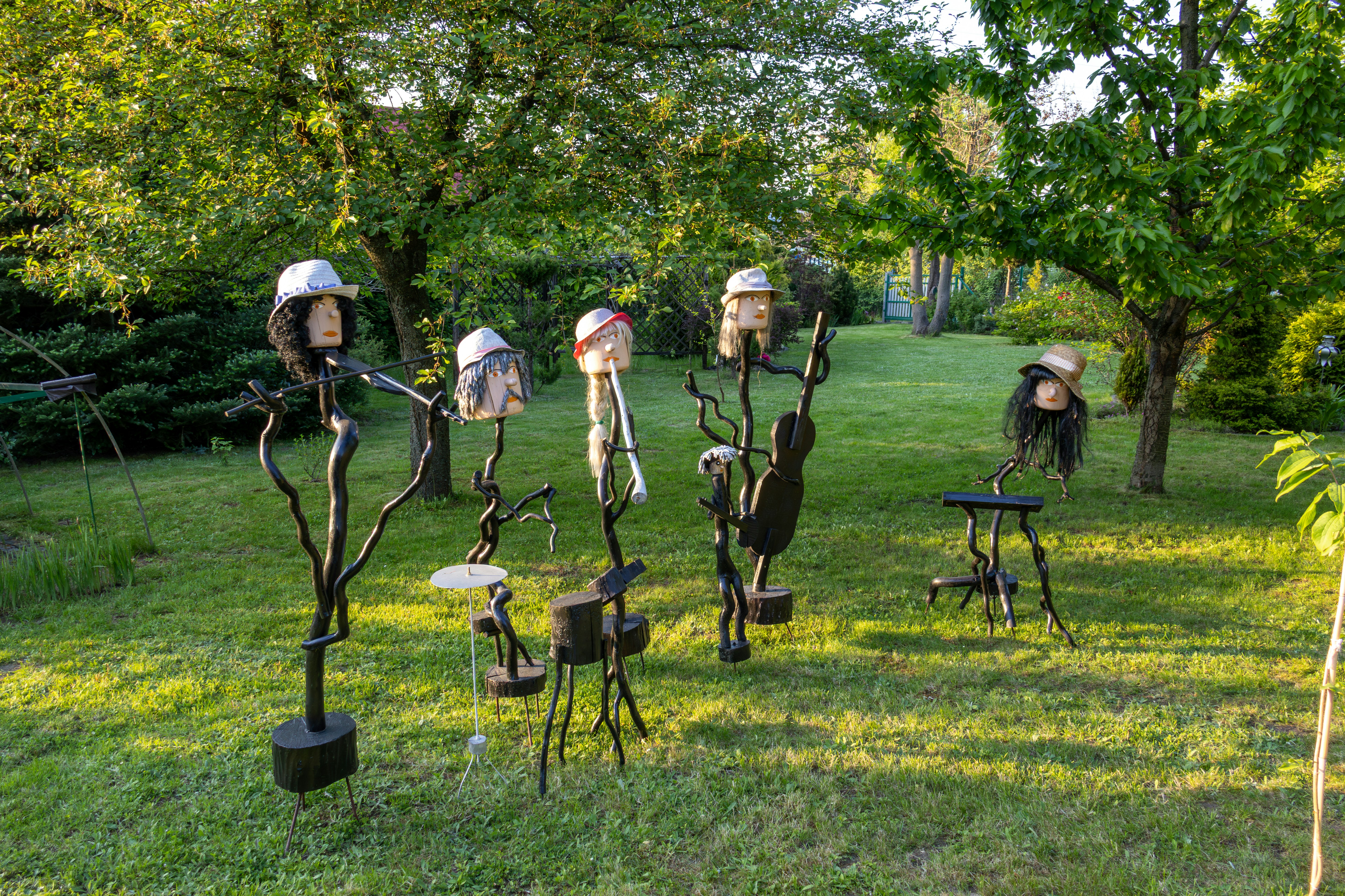 Whimsical Metal Ensemble in Sunlit Garden