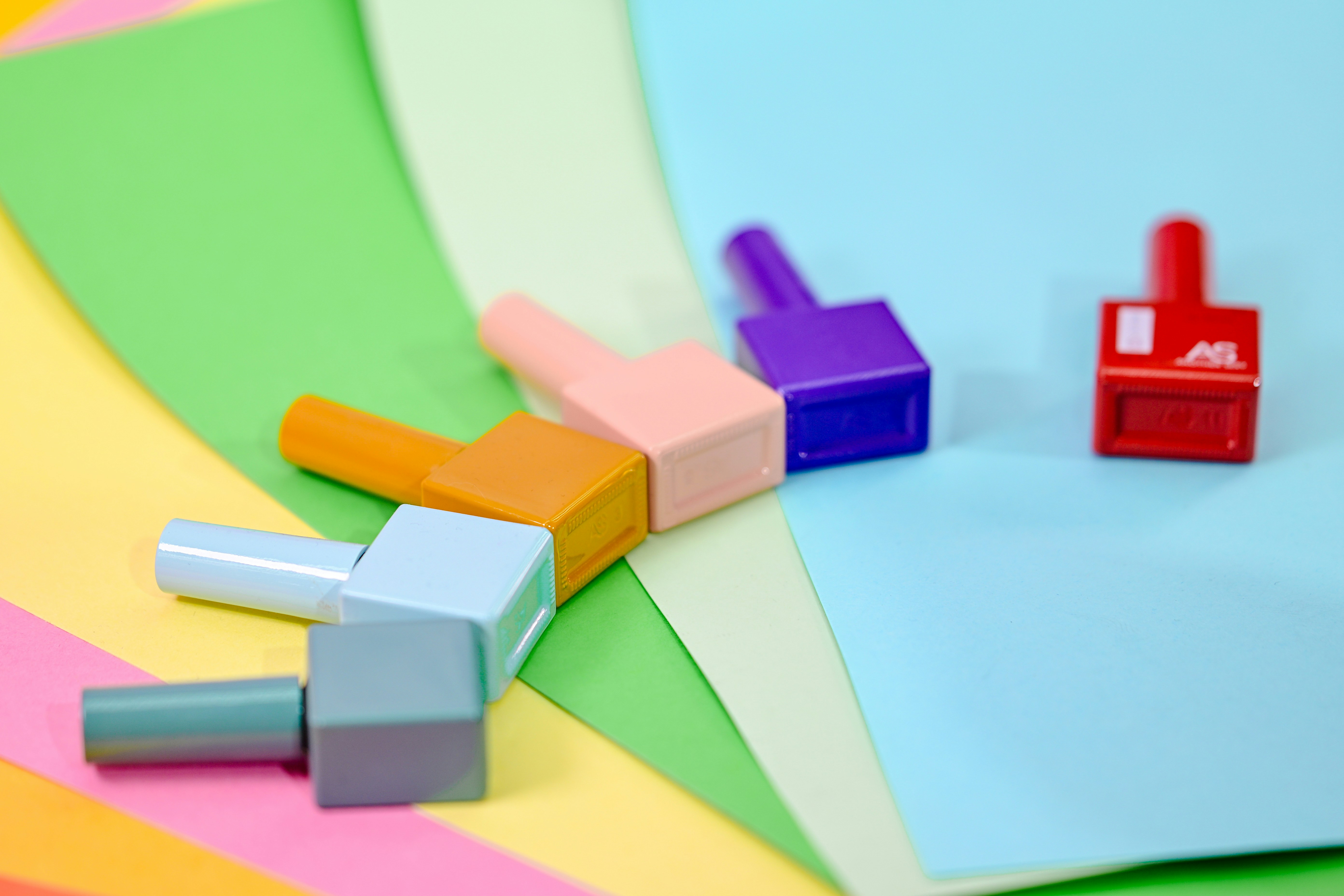 Colorful Crafting Stamps in Soft Studiobackdrop