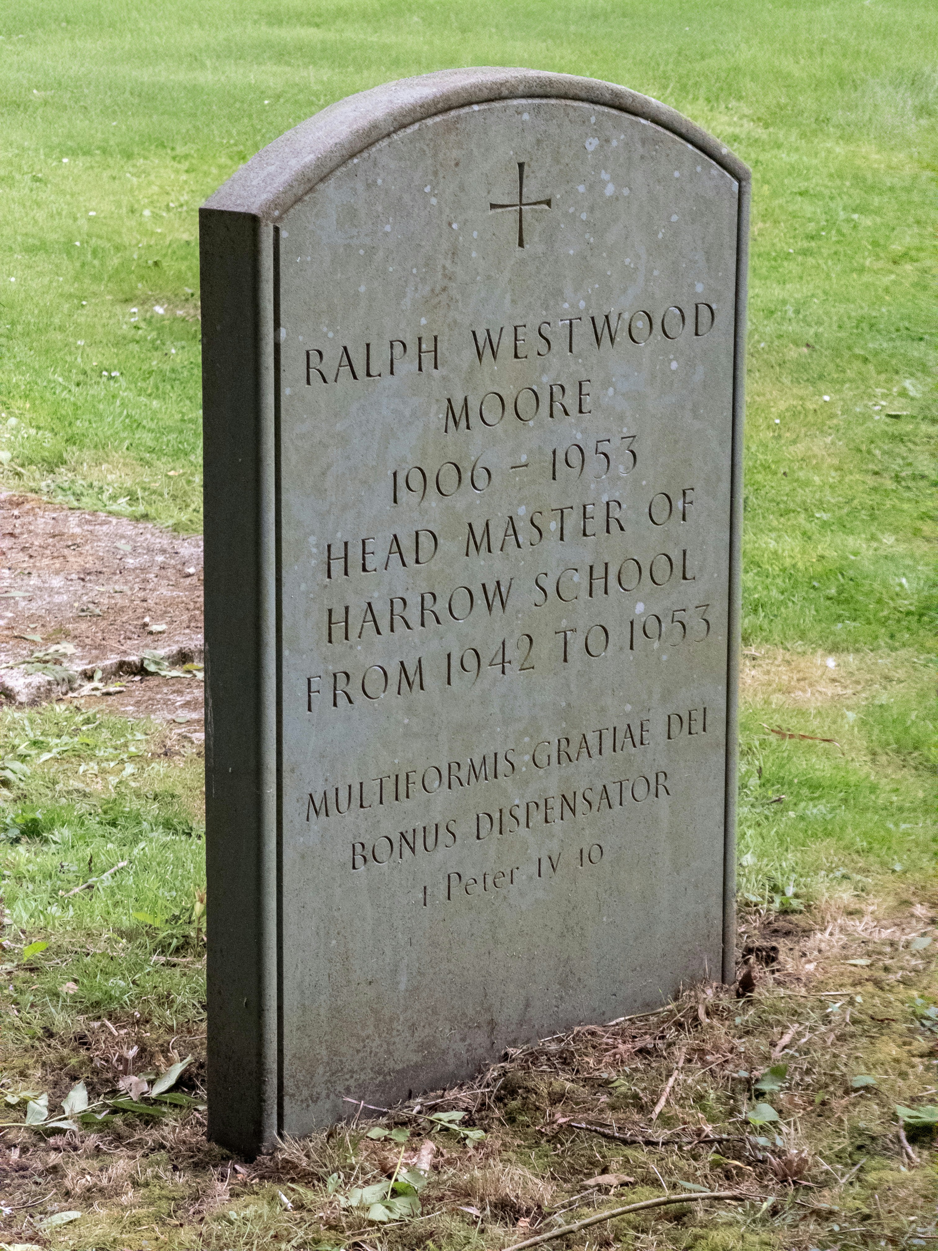 Inscription on a Weathered Tombstone in a Cemetery