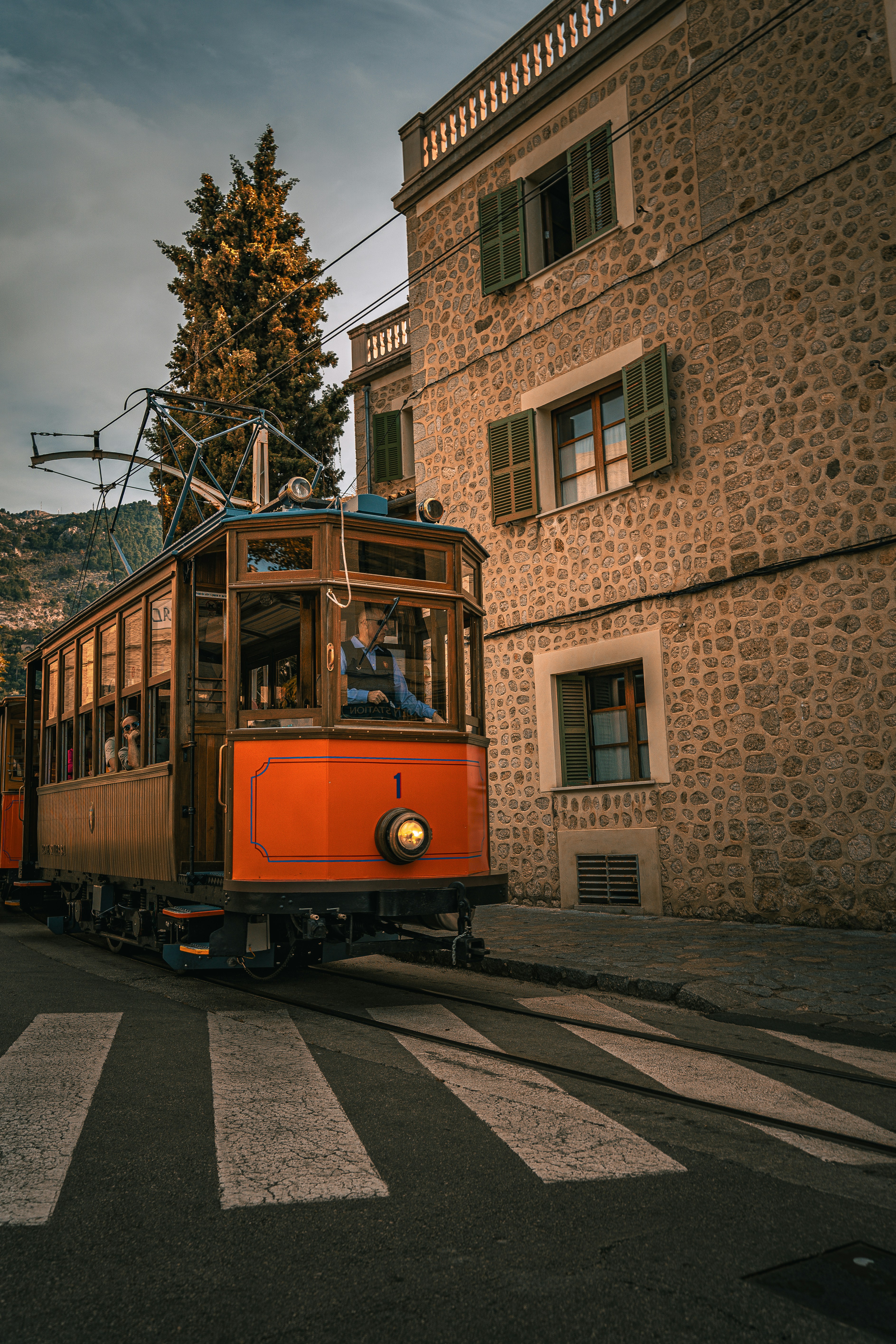Old Streetcar Crossing a Stone Town