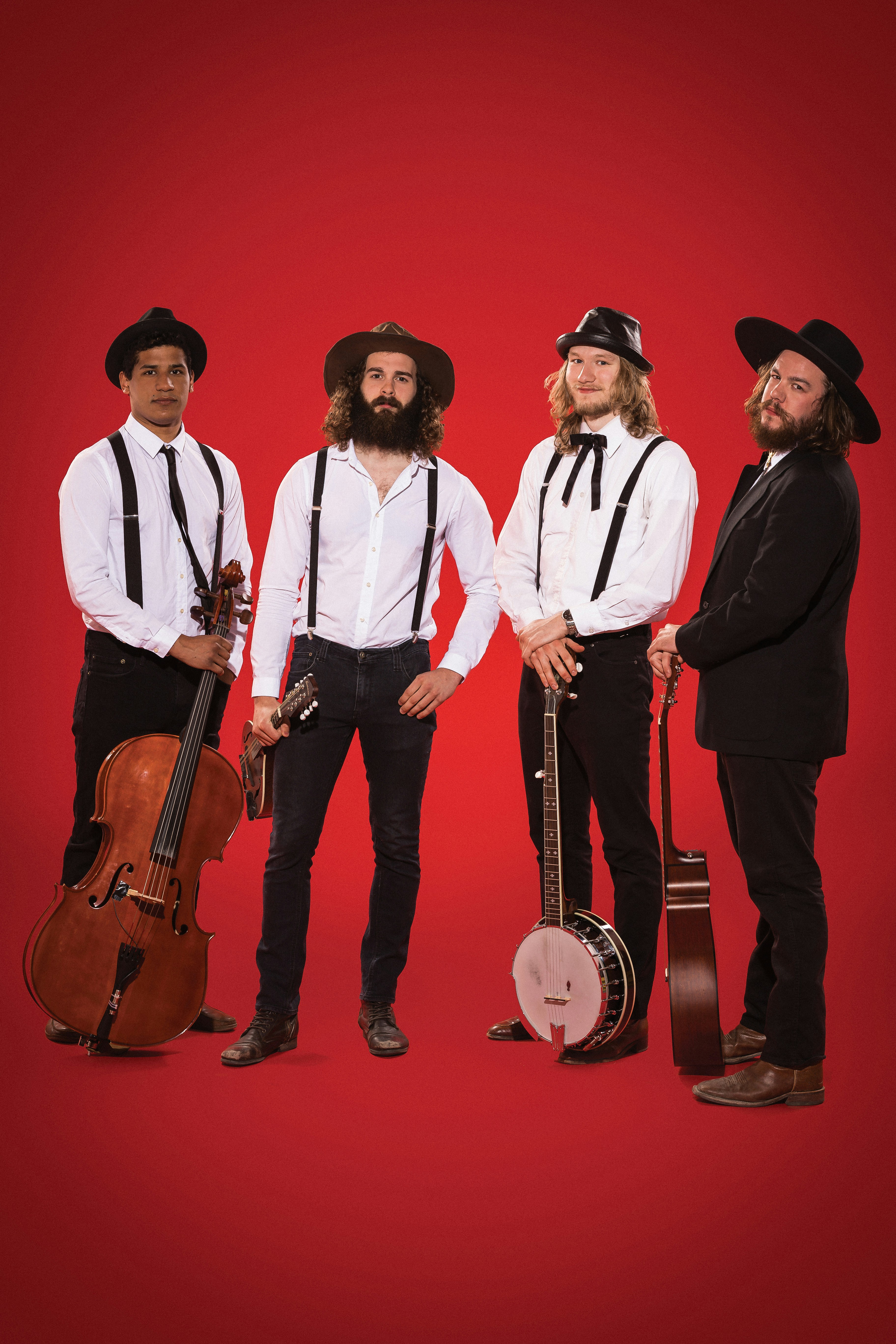  quartet in red: strings and bows under a bold spotlight