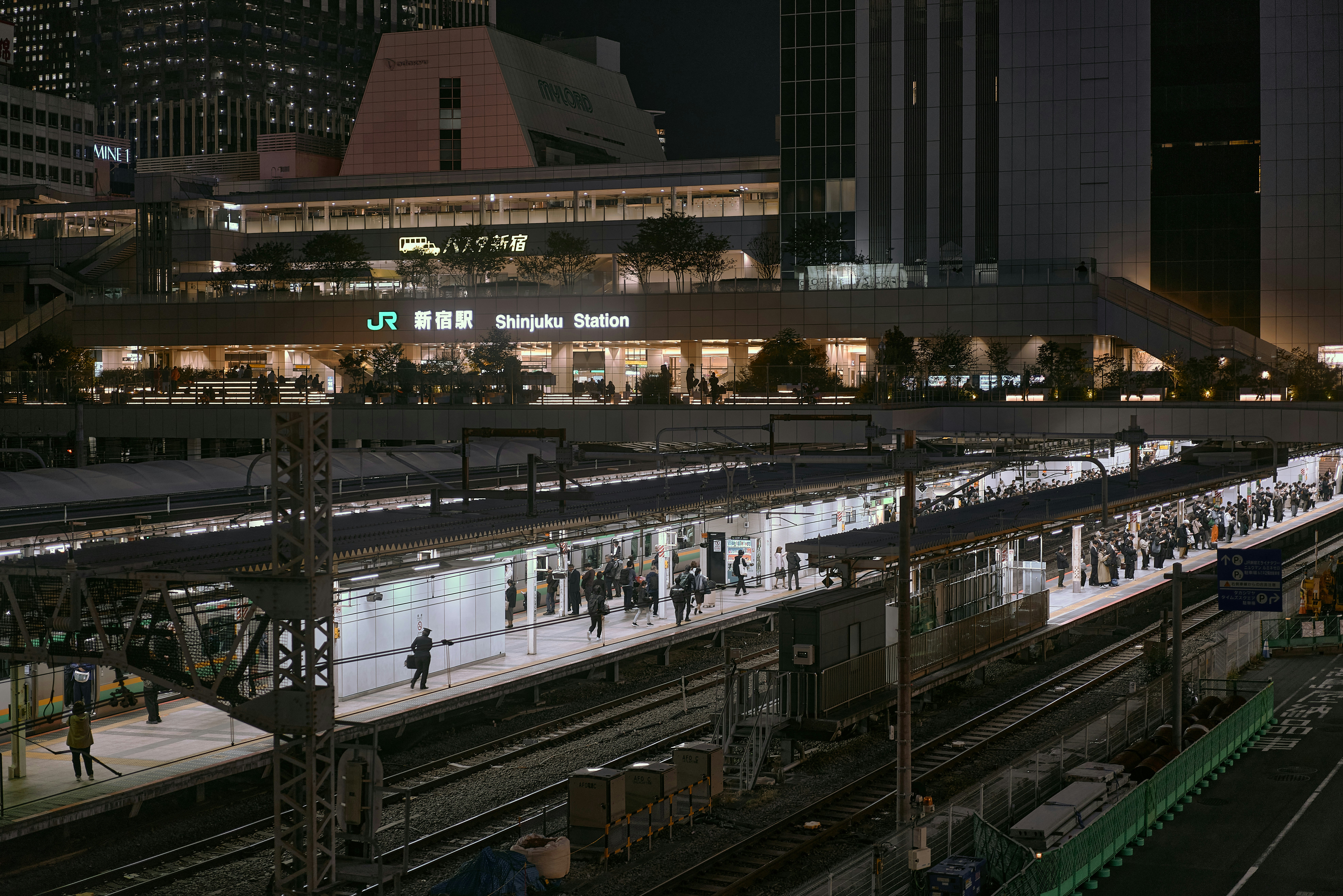 Night Train at Shinjuku: Quiet Platform Illuminates Tokyo’s Pulse