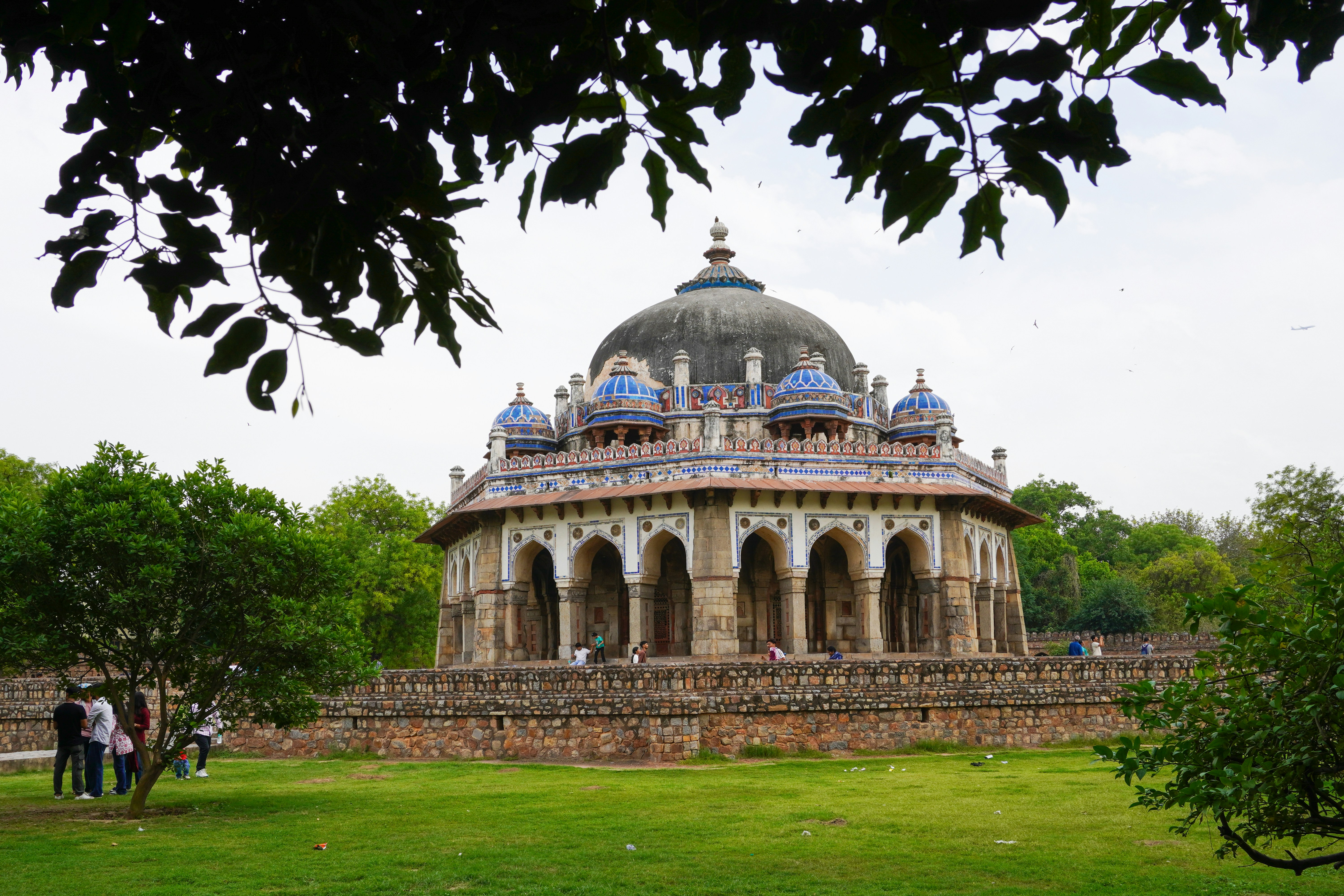The Blue Dome Shrine Rising from a Lush Green Clearing