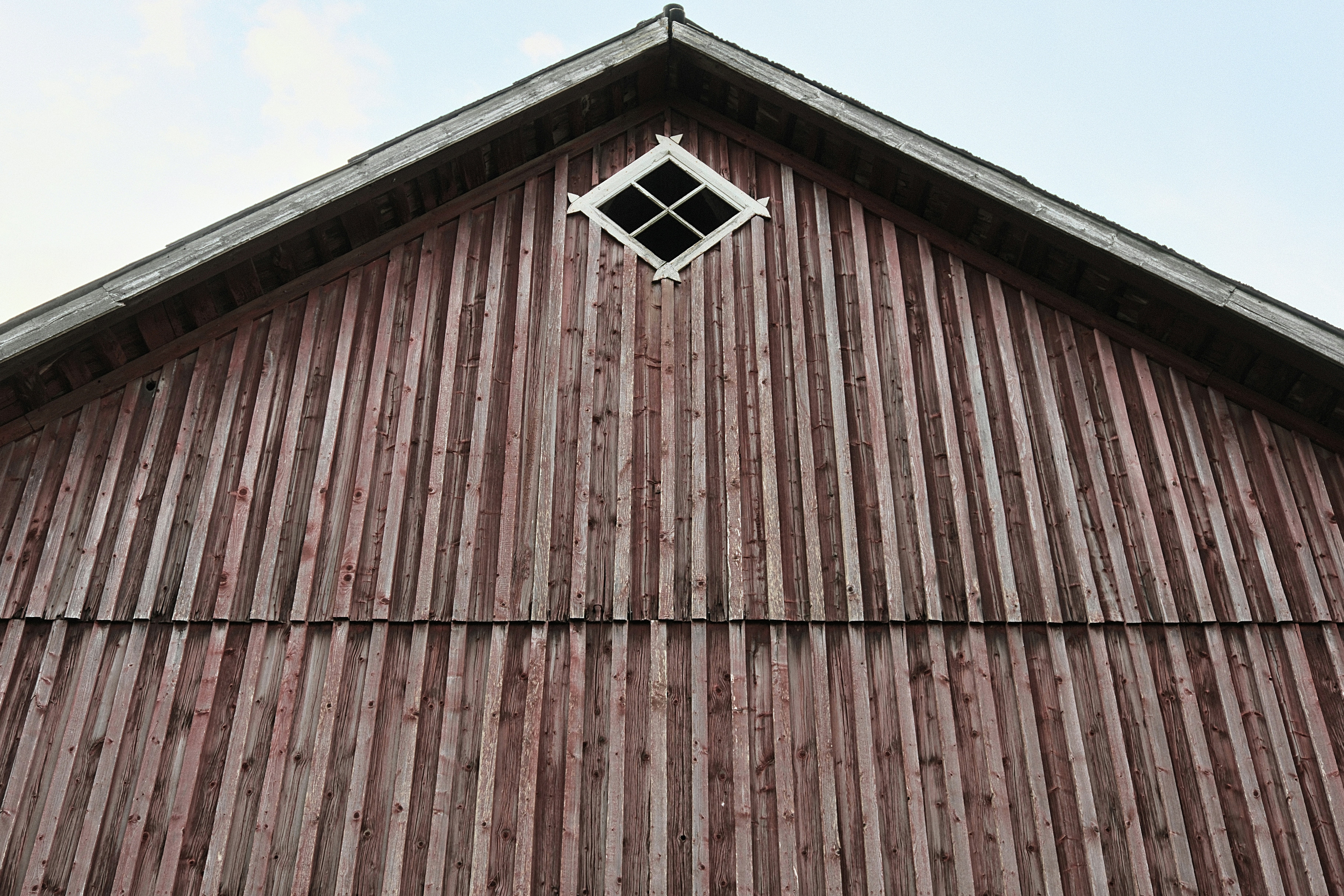 Celestial Diamond Window Crown on Weathered Cedar Siding