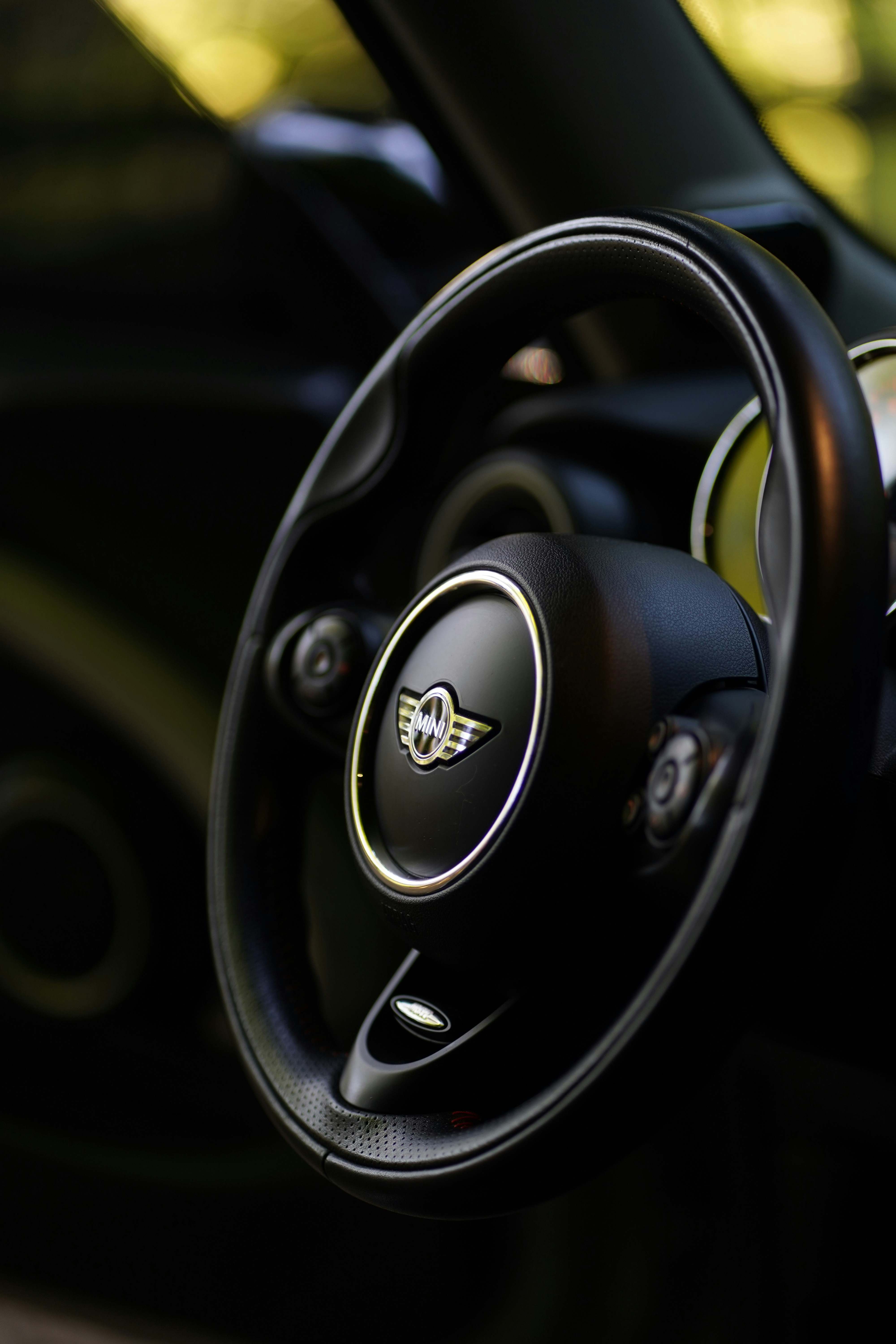 A Moment at the Wheel: Close-Up of the Mini Cooper Steering Crest