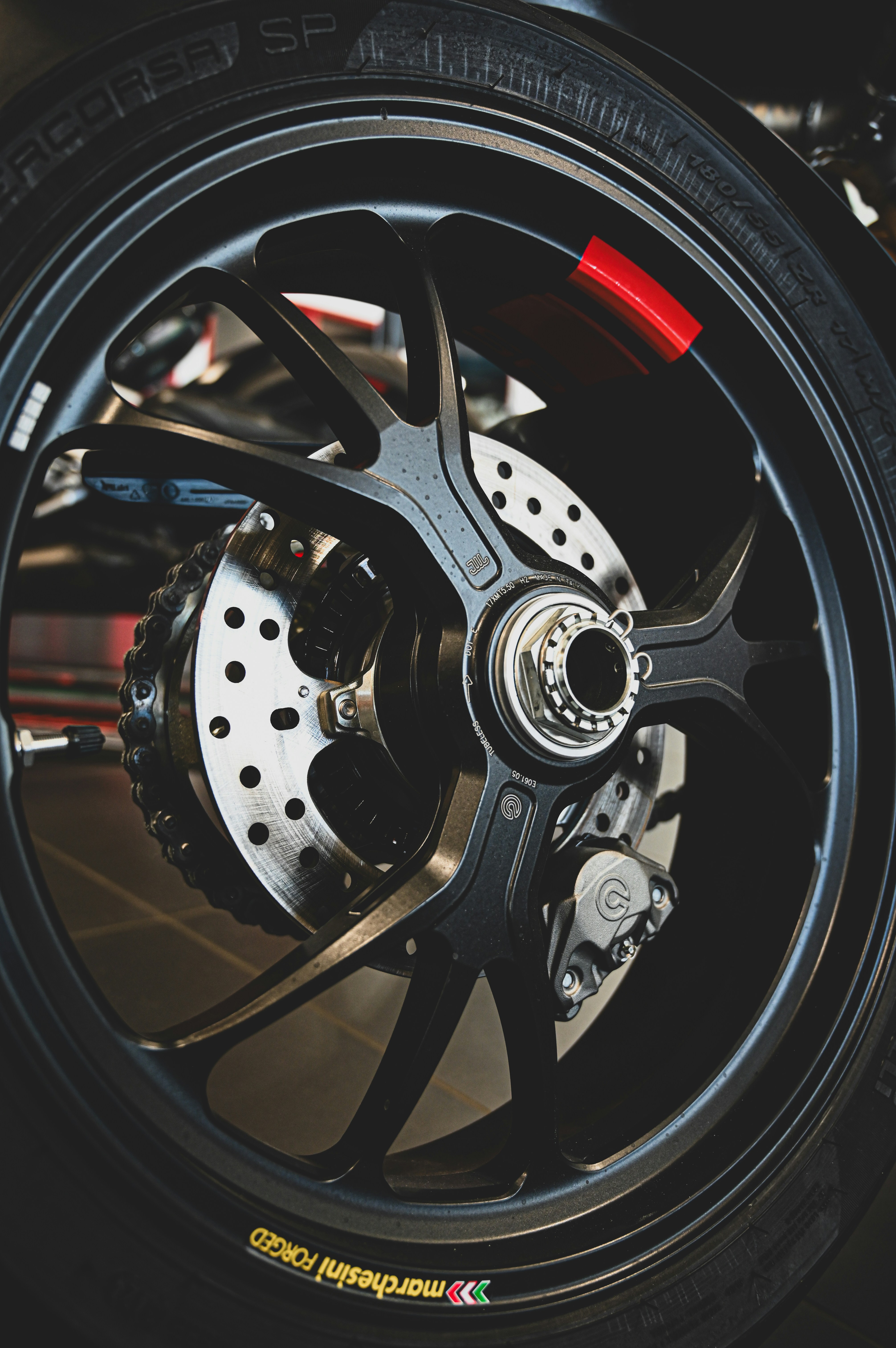 Rotating Precision: close-up of a sport bike wheel and disc brake