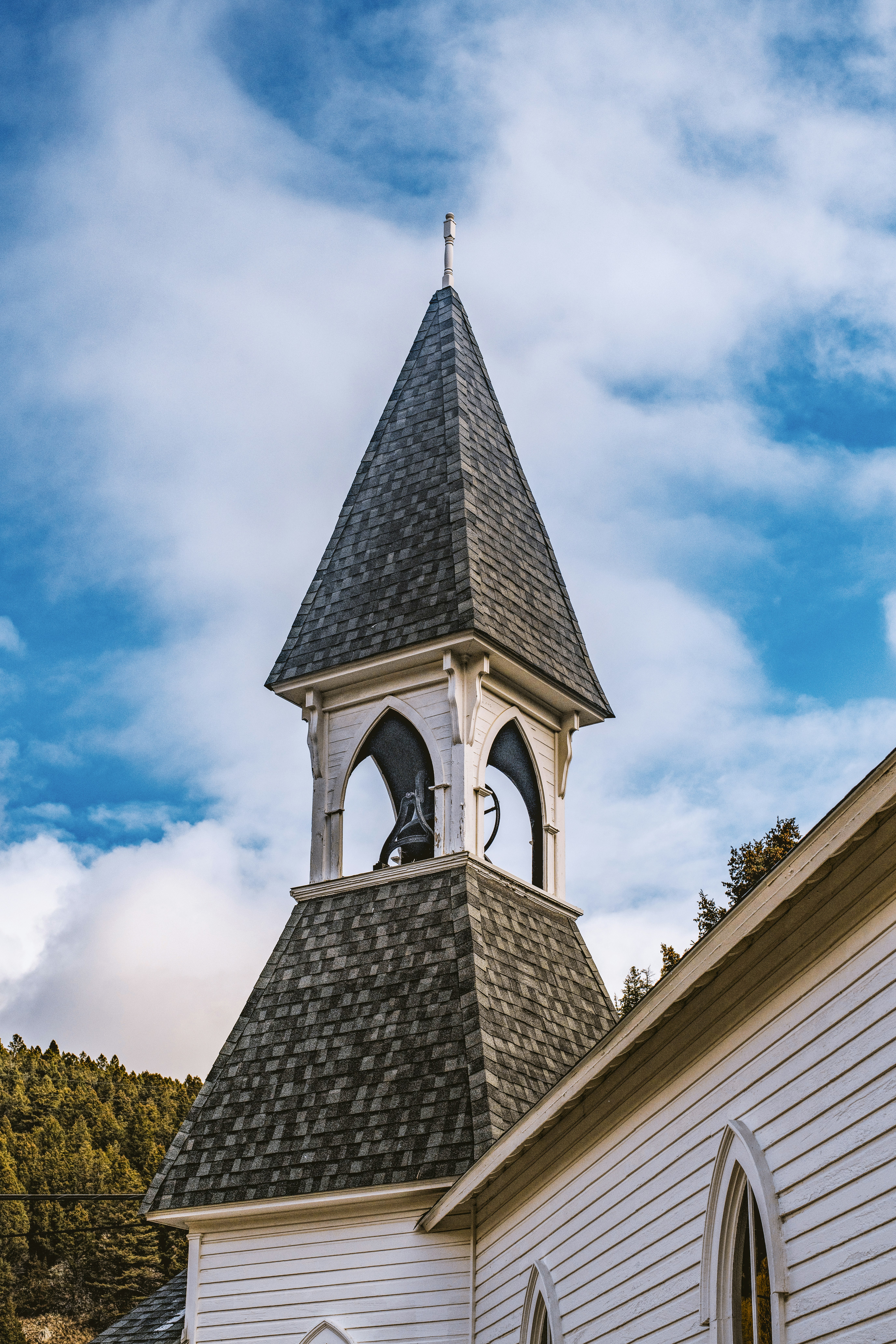 A Steepled Gable Reaches Toward a Bright Sky
