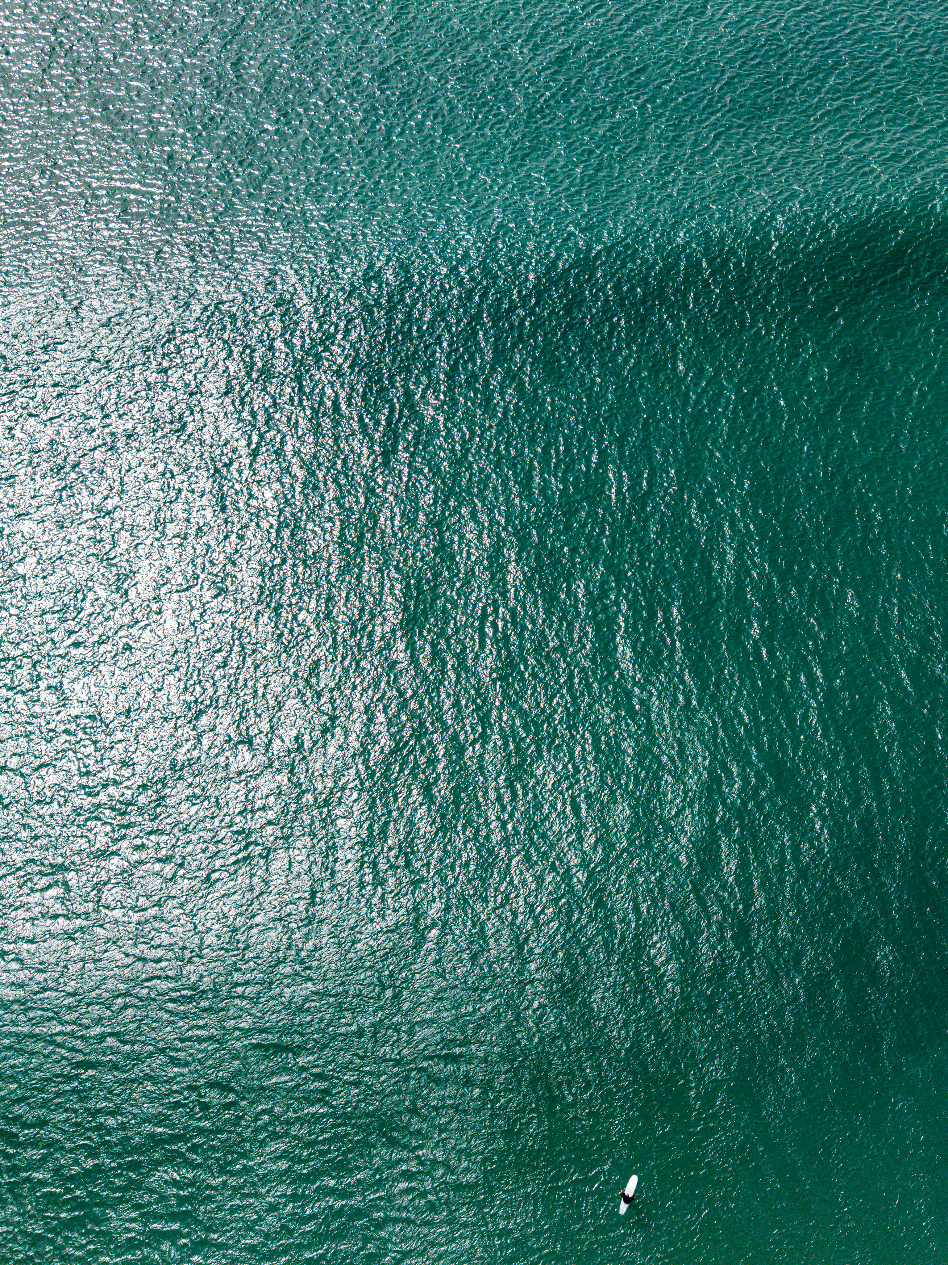 Solitary Boat in Teal Horizon