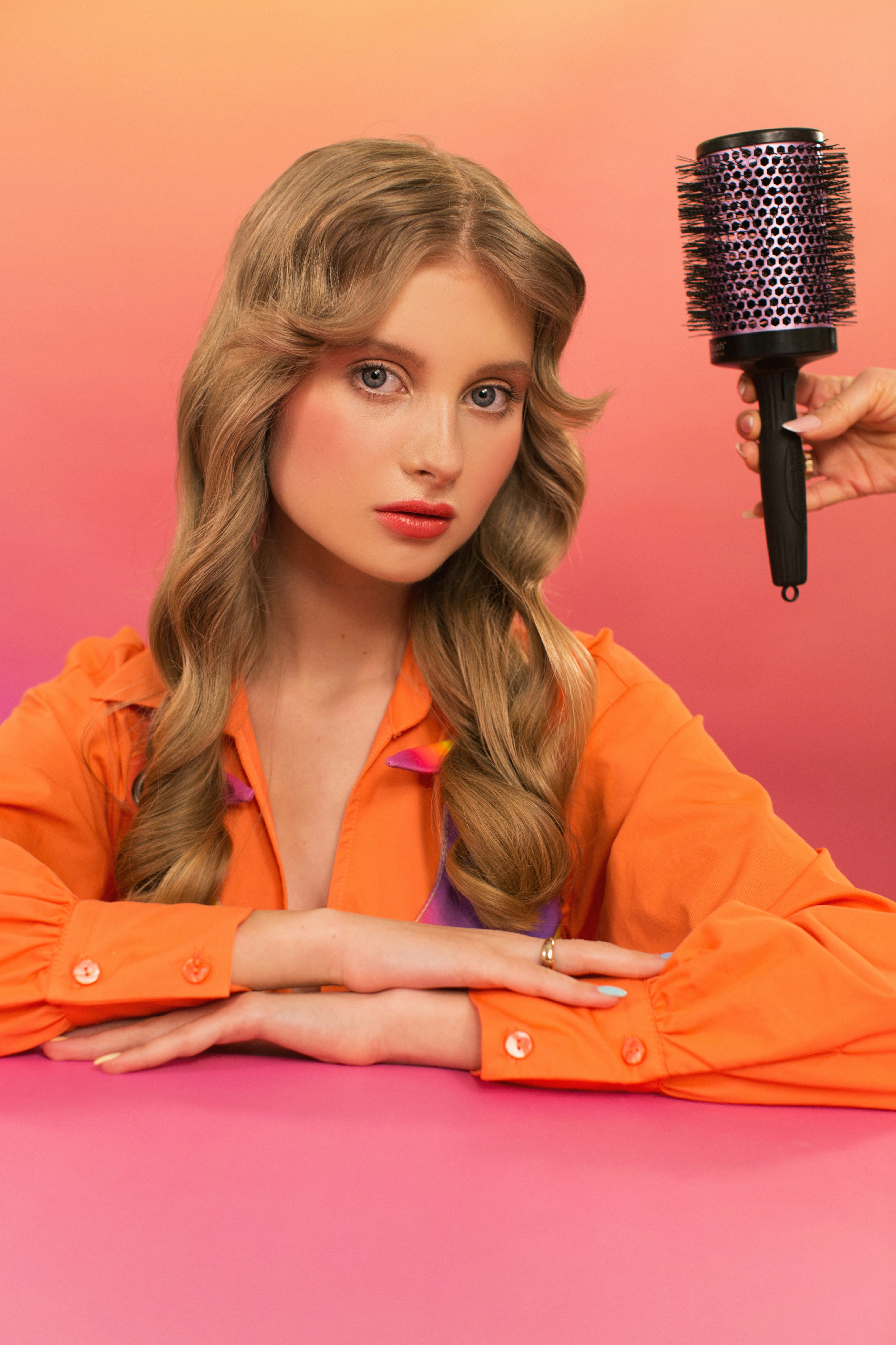 Portrait in Coral Light: The Quiet Gaze with a Rollerbrush Parting