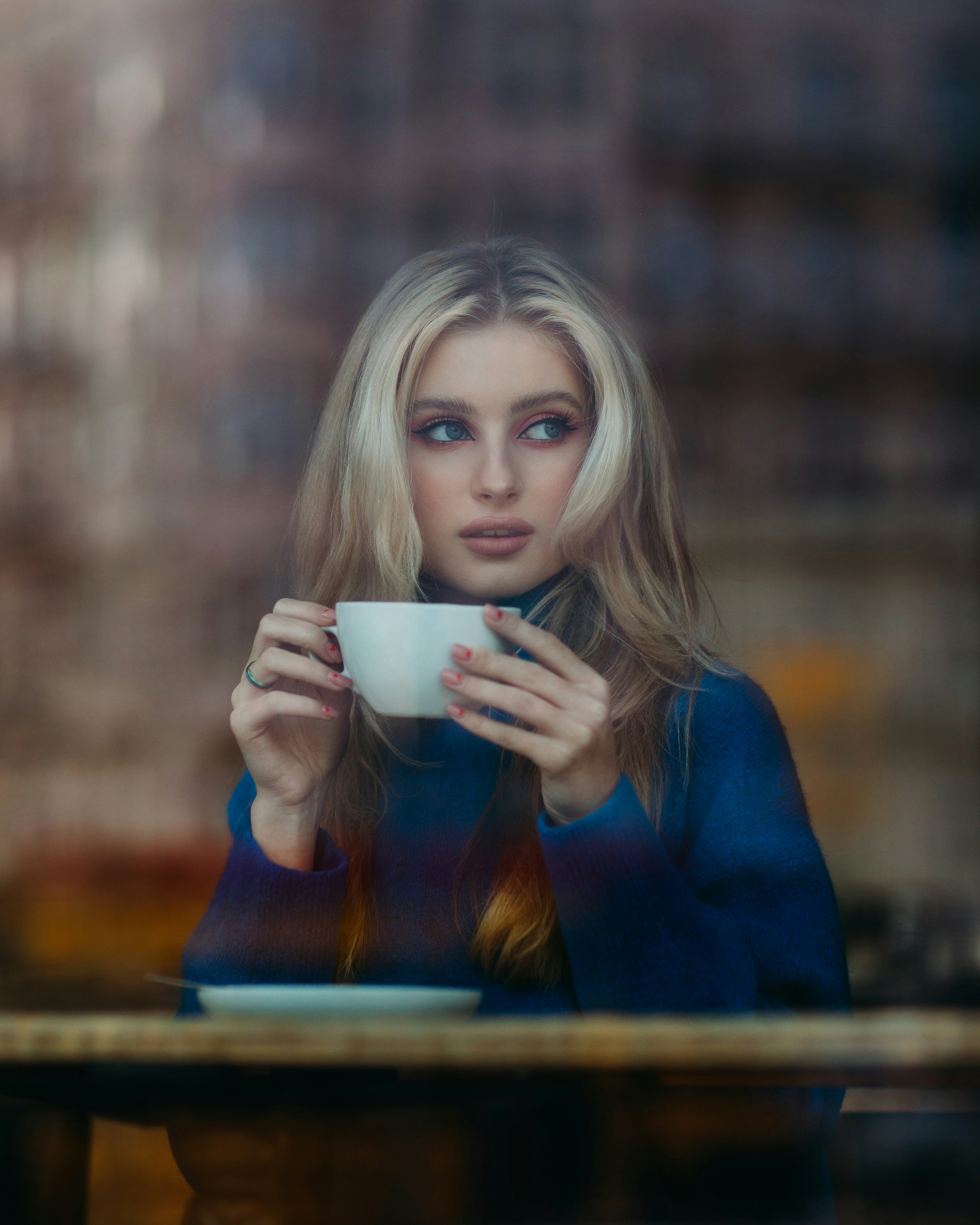 Tea Time Reverie: A Quiet Moment Behind Glass