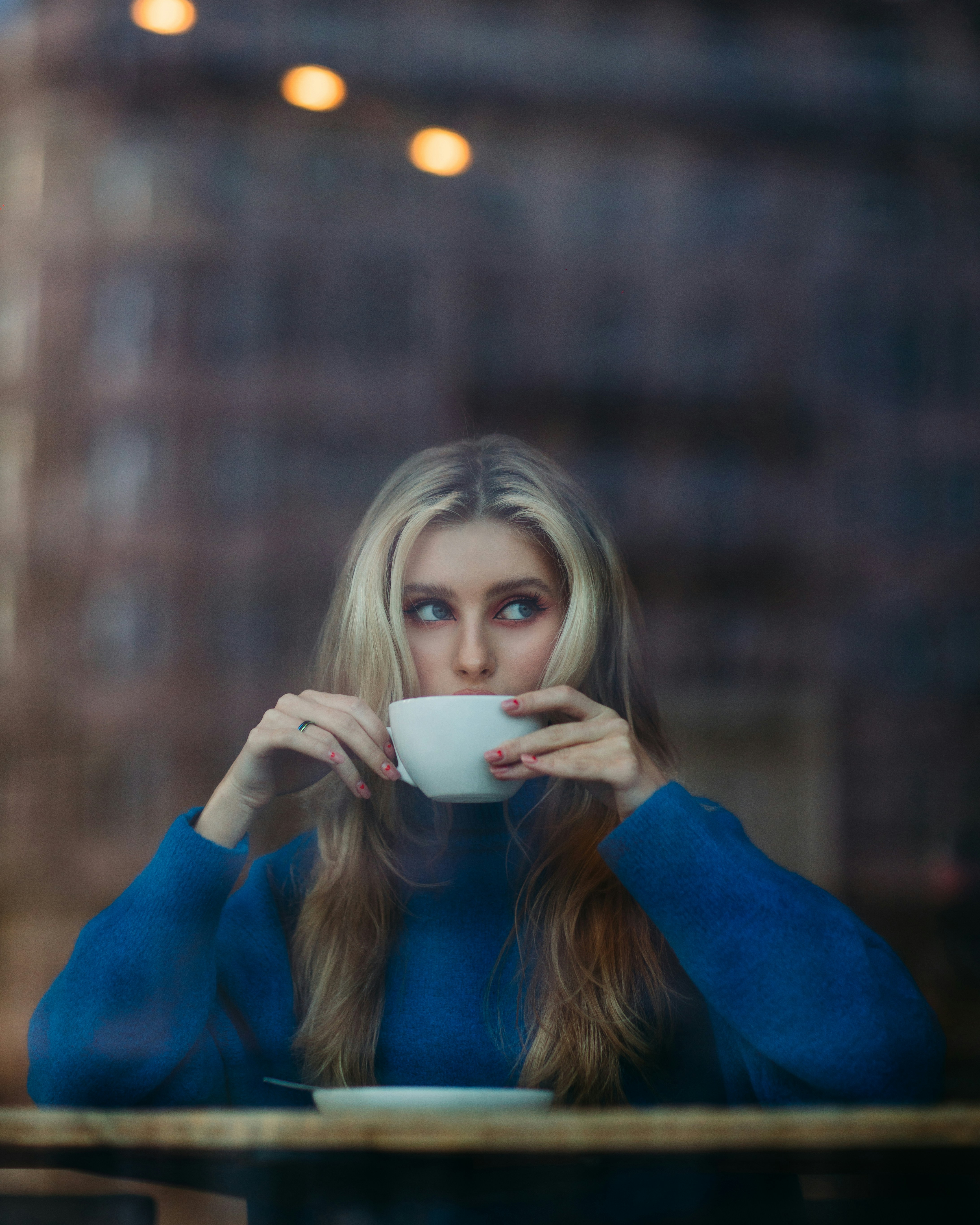 Cafe Calm: Blonde Barista with a Quiet Gaze