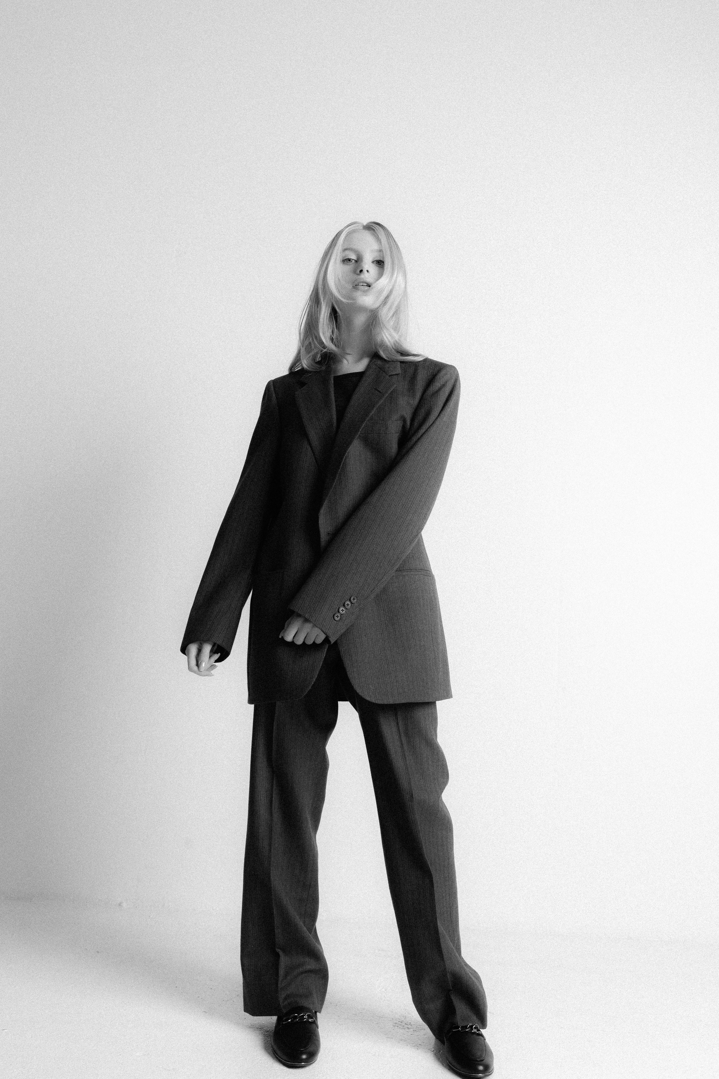 Power in Silence: A Monochrome Suit Portrait